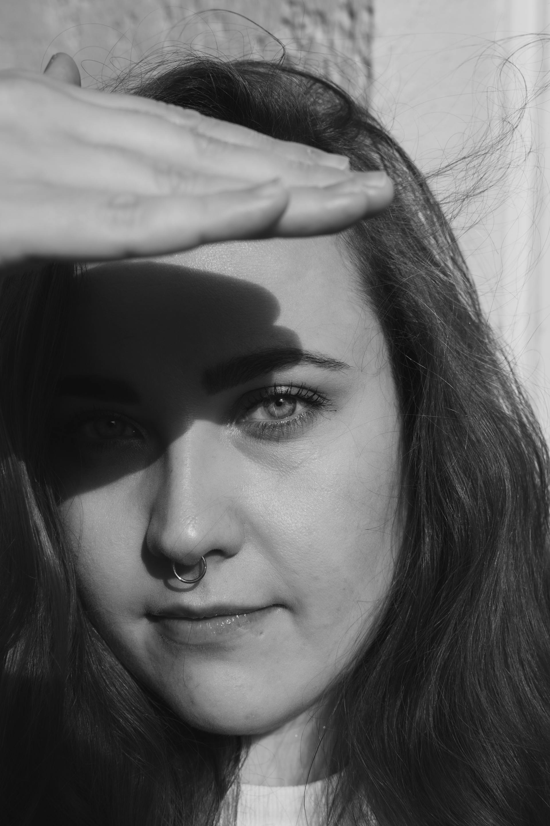 Portrait of Woman with Hand over Forehead · Free Stock Photo