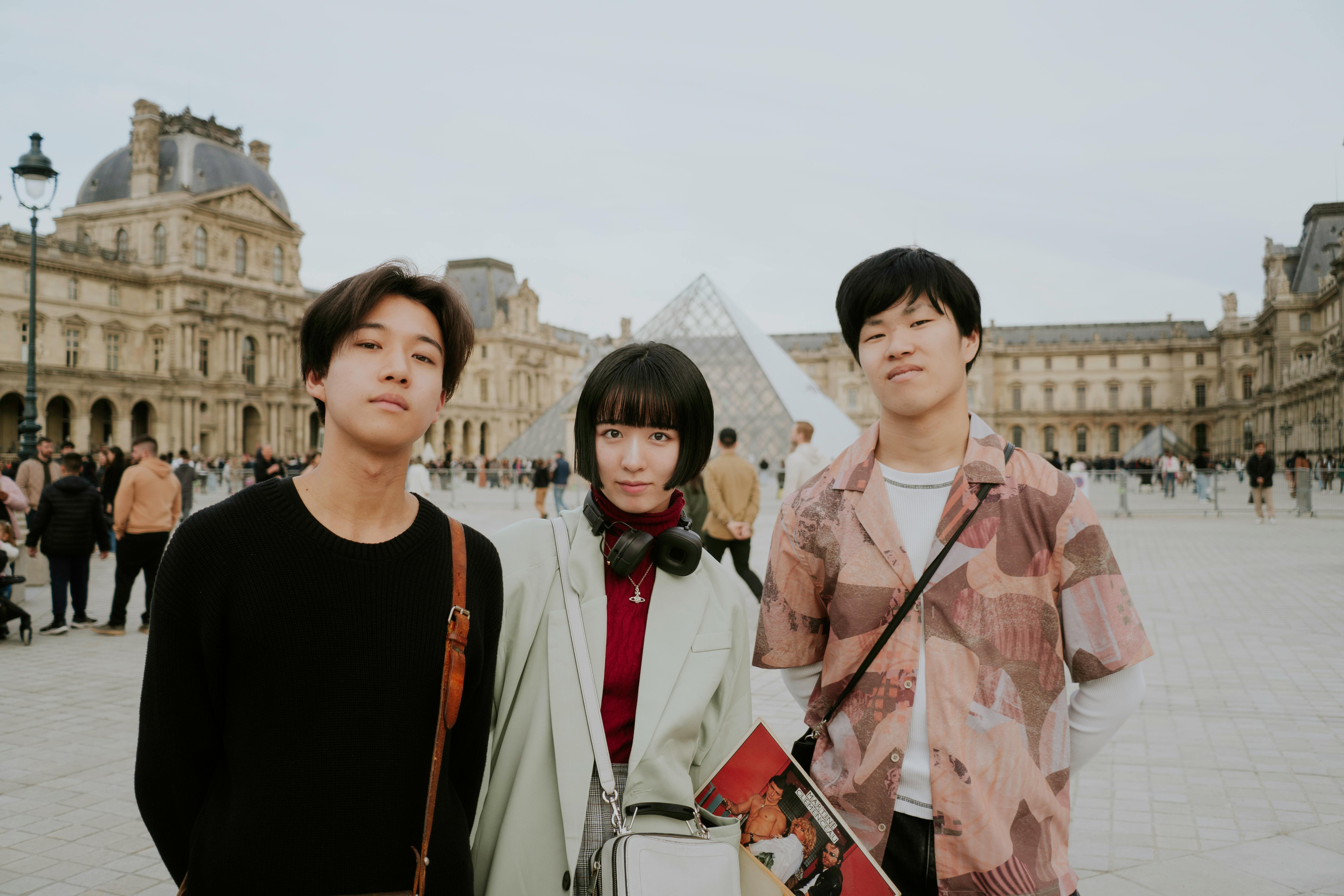 Portrait of Men and Woman at Louvre · Free Stock Photo