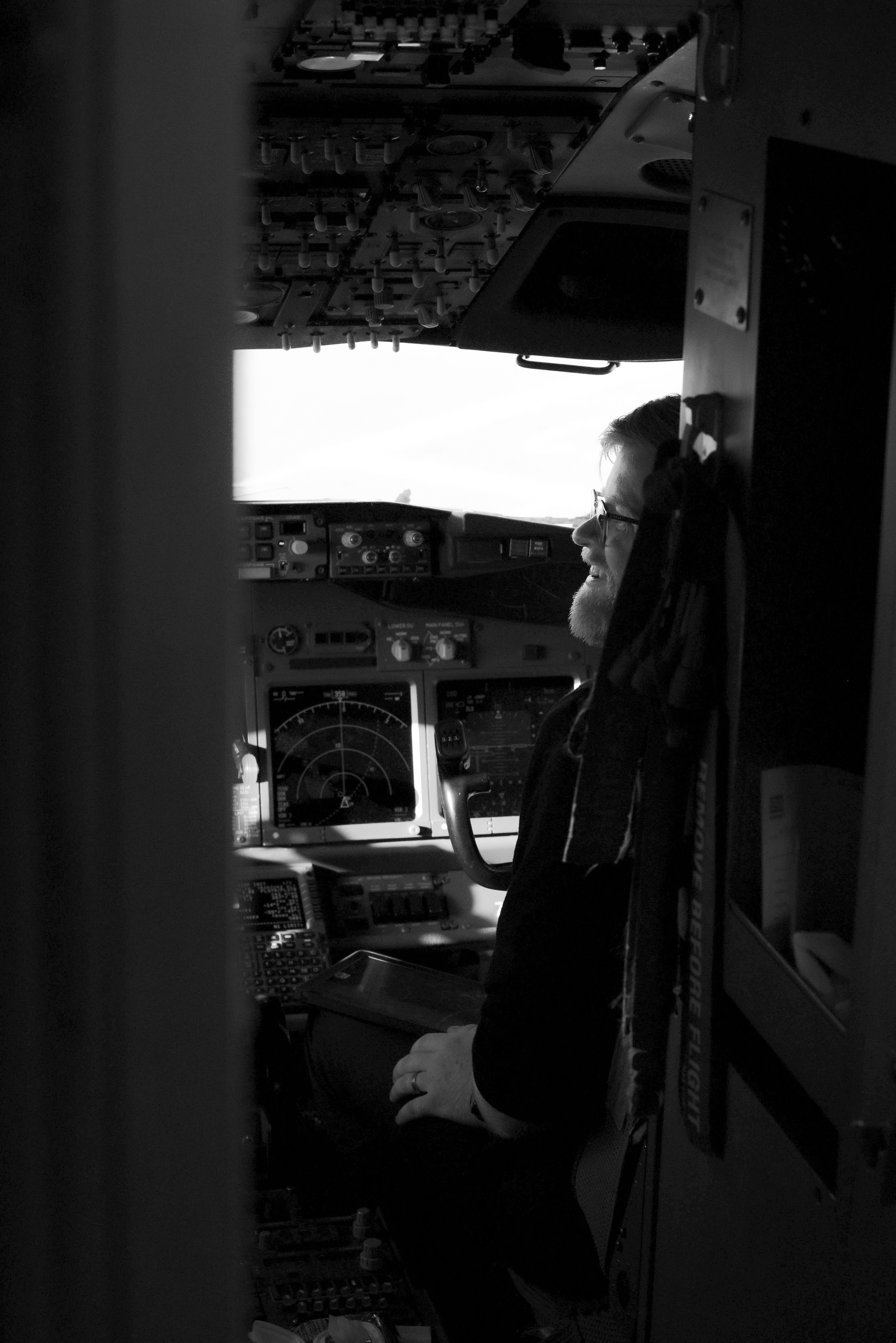 Man Sitting Inside a Cockpit of an Airplane · Free Stock Photo