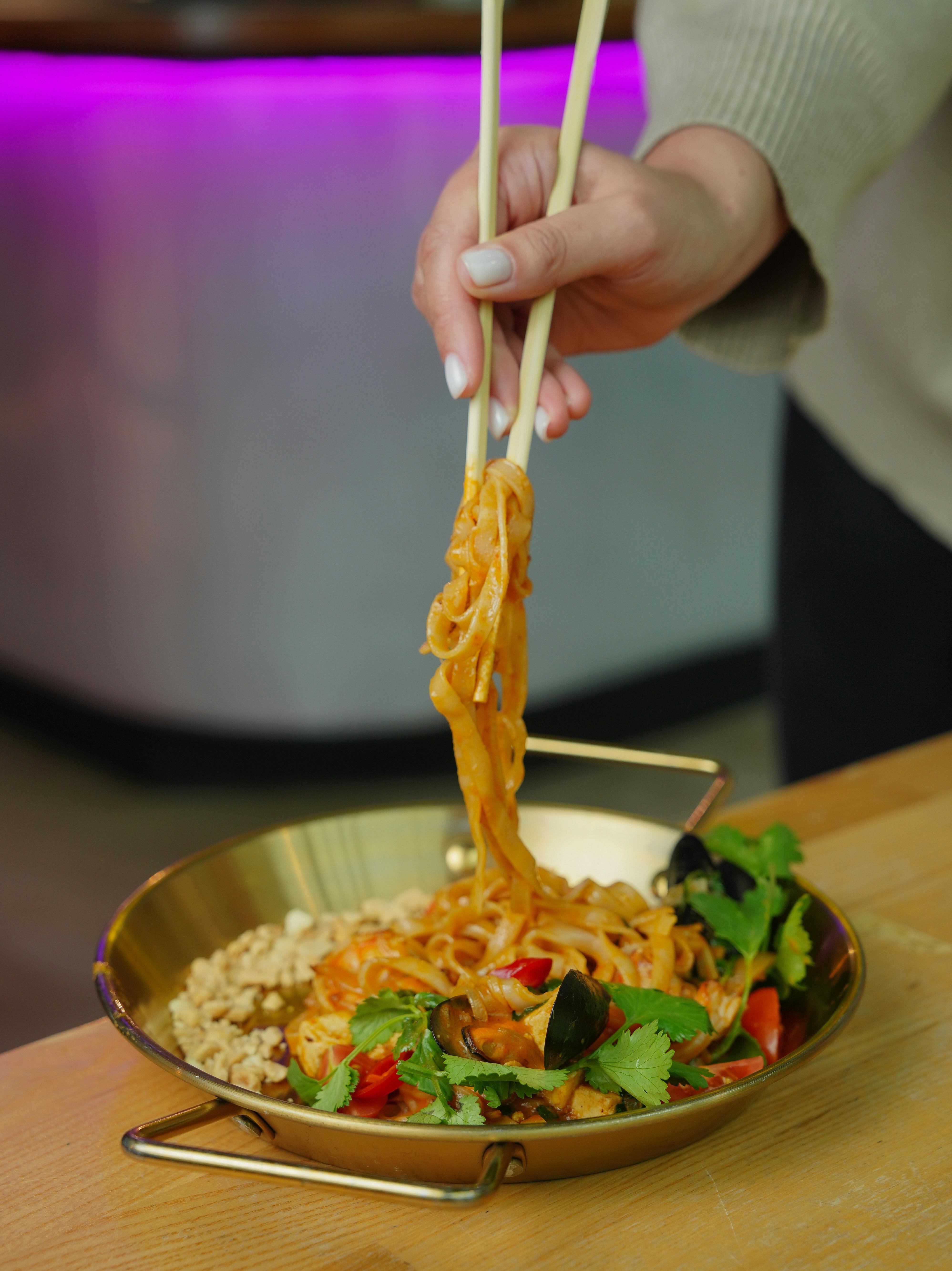Photo of a Noodle Dish with Row Vegetables · Free Stock Photo