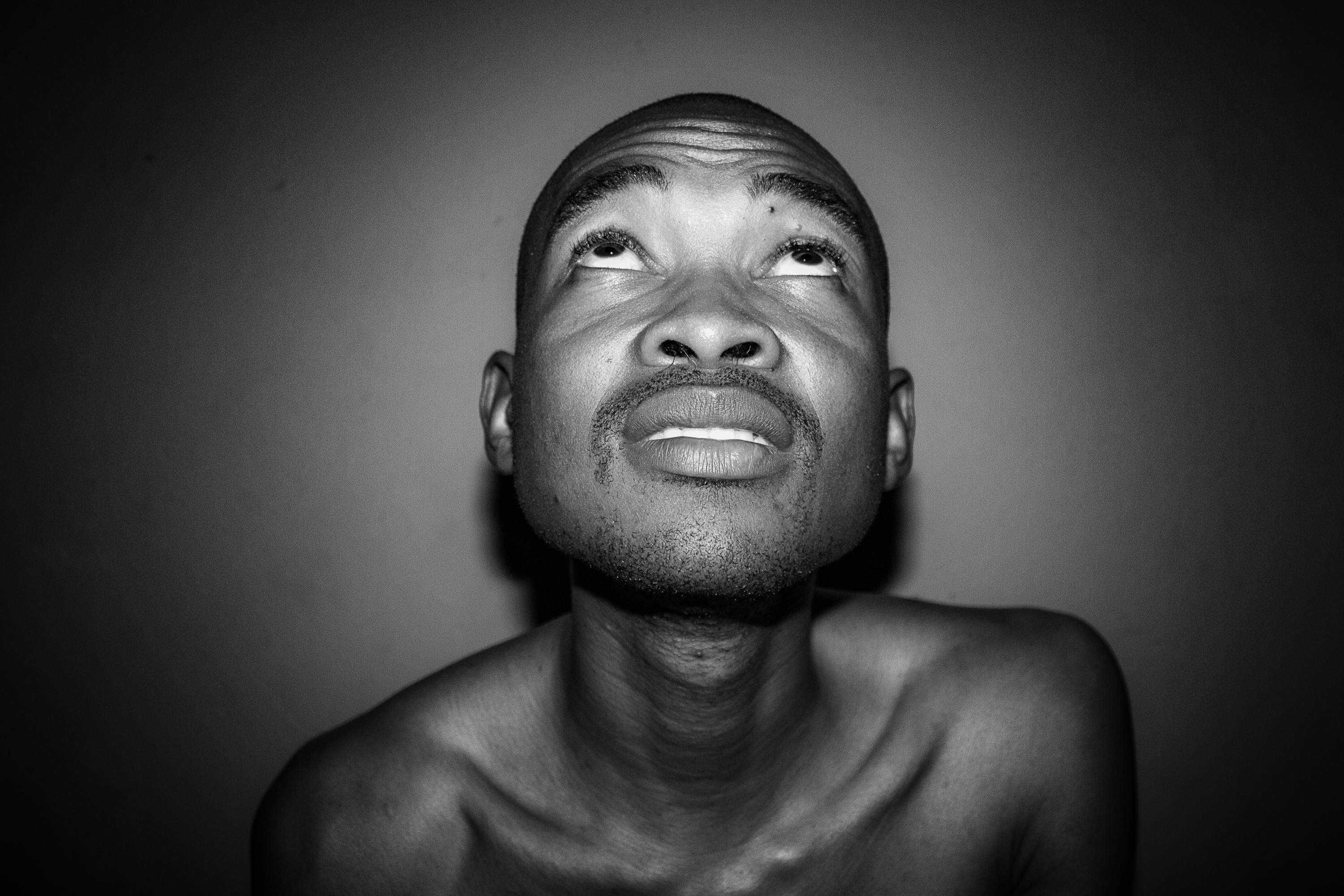 Portrait of Man Wearing Shell Choker Necklace · Free Stock Photo