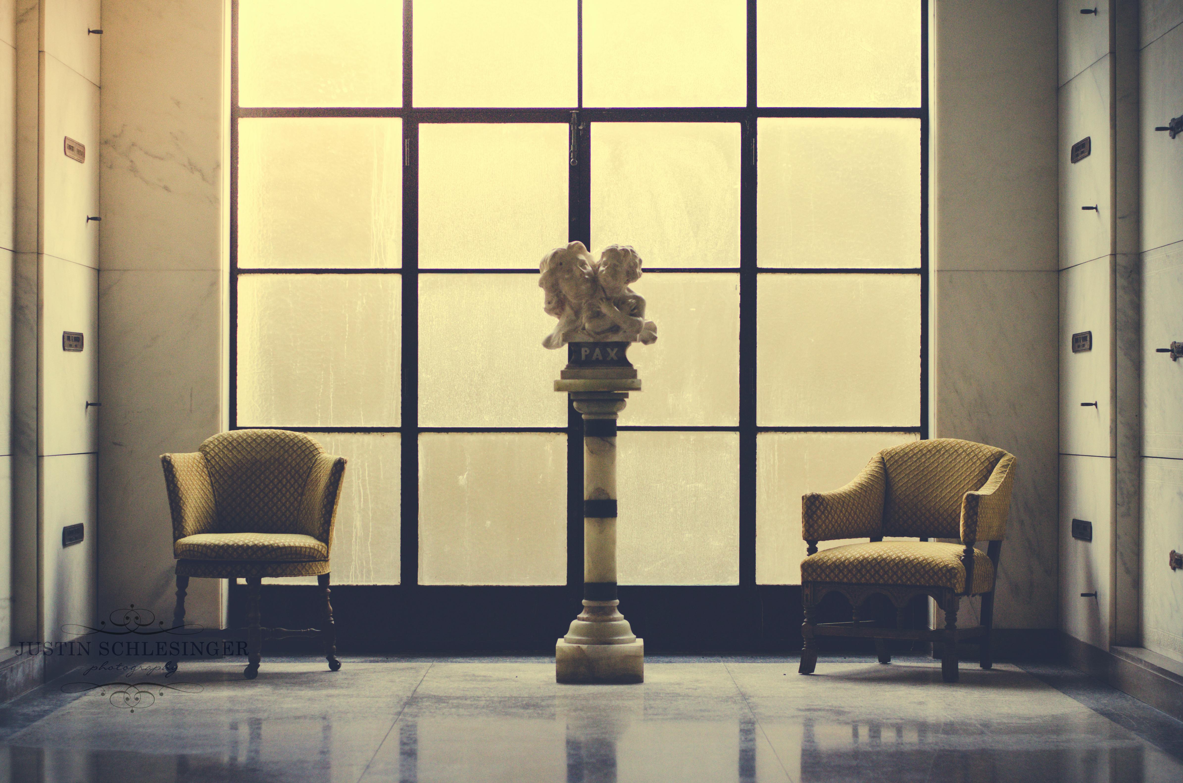 Sculpture with PAX Sign on Pedestal · Free Stock Photo