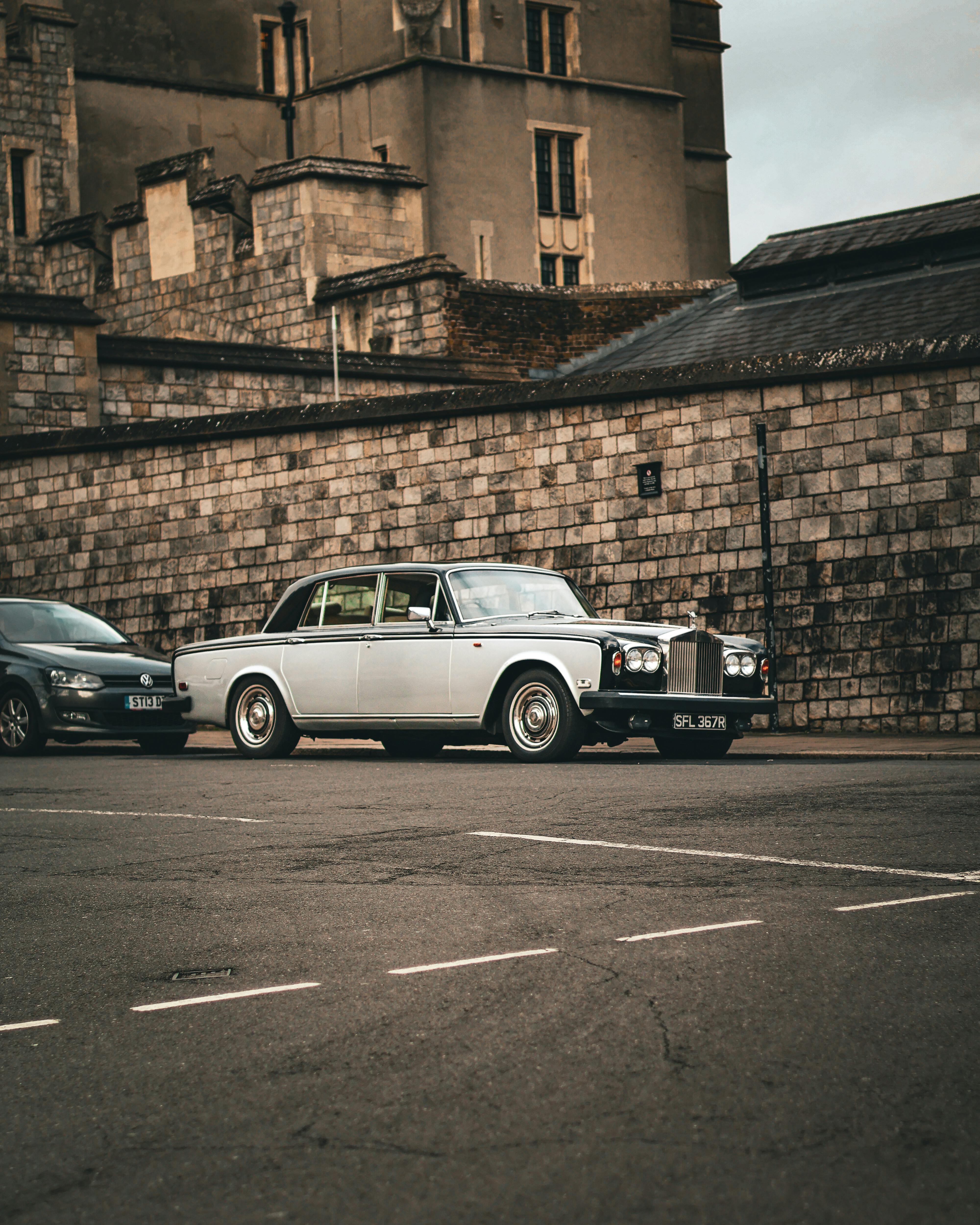 Black Rolls-Royce Wraith Parked in the Alley with the Open Drivers ...
