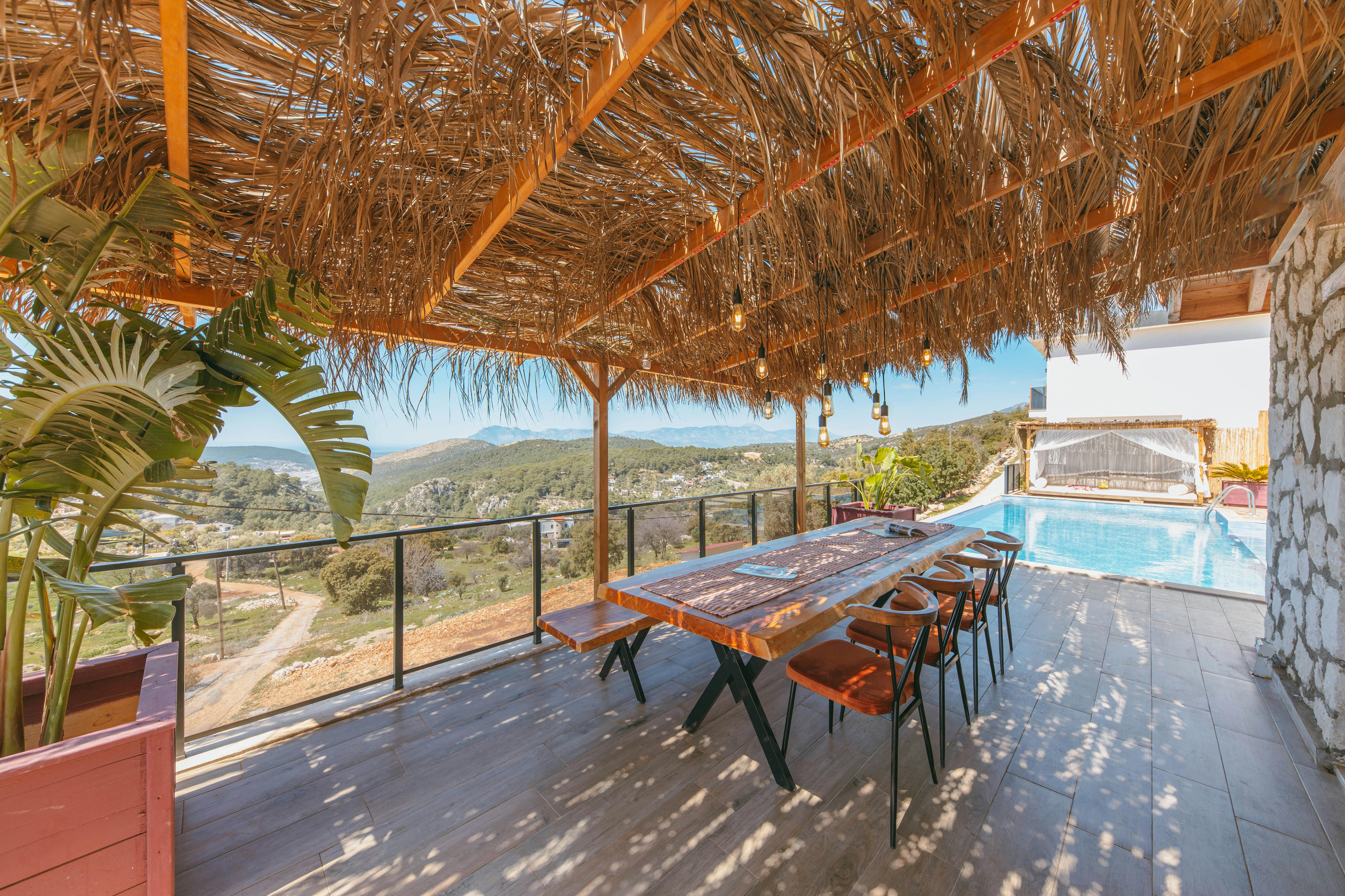 Cafe with outdoor tables in tropical resort · Free Stock Photo