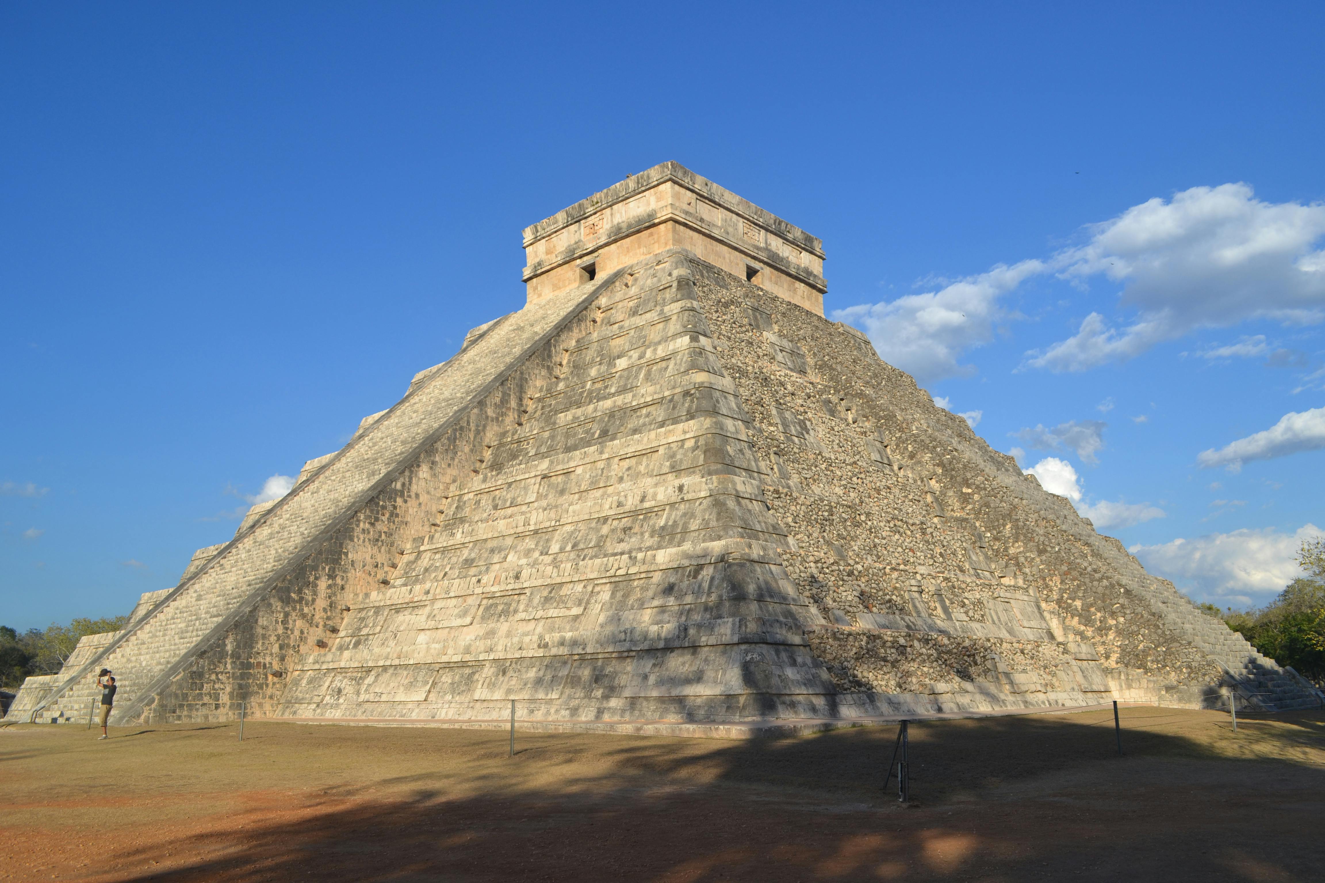 Gray Pyramid on Grass Field during Day · Free Stock Photo
