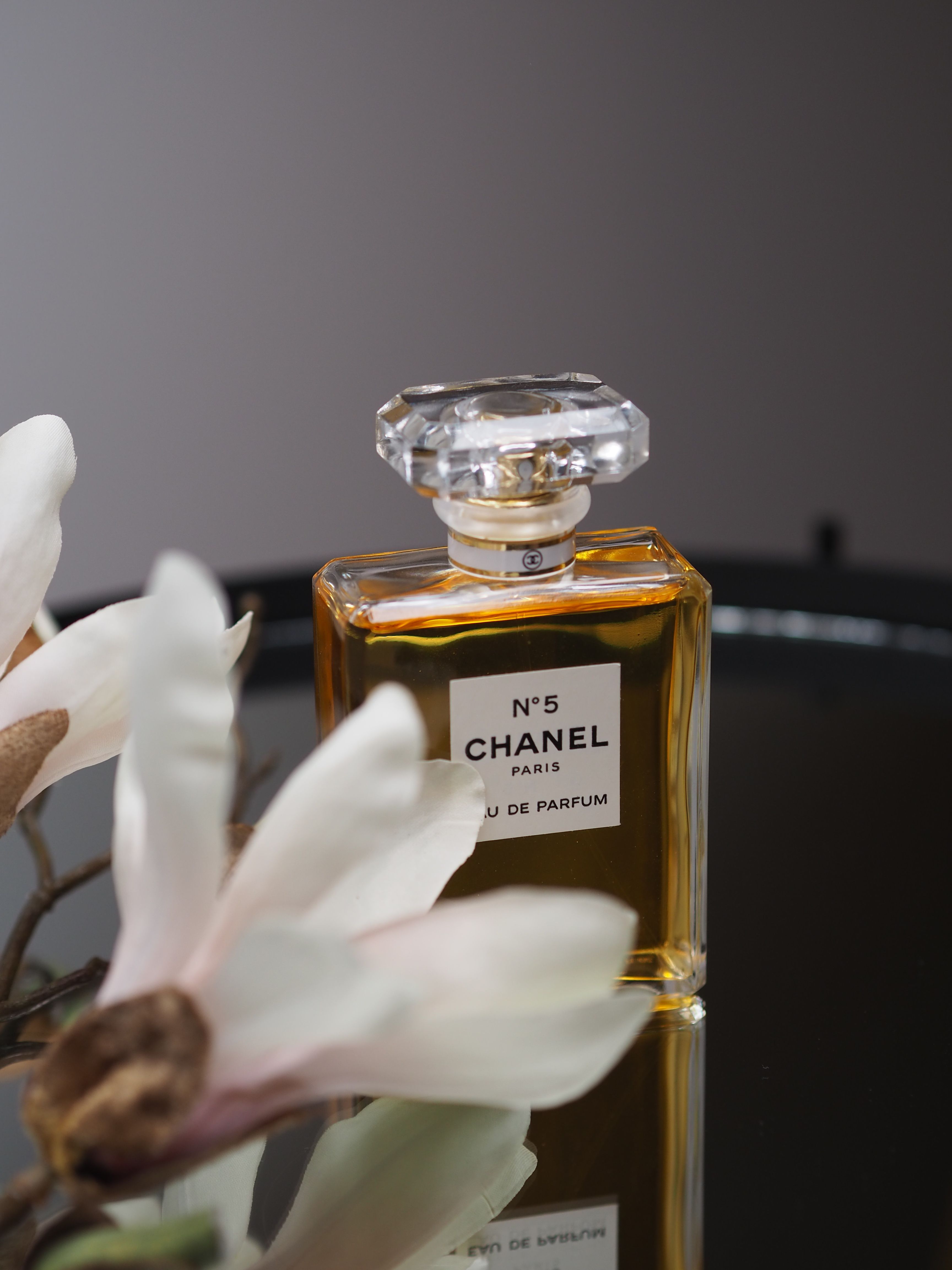 Vial of Perfume and Flower · Free Stock Photo
