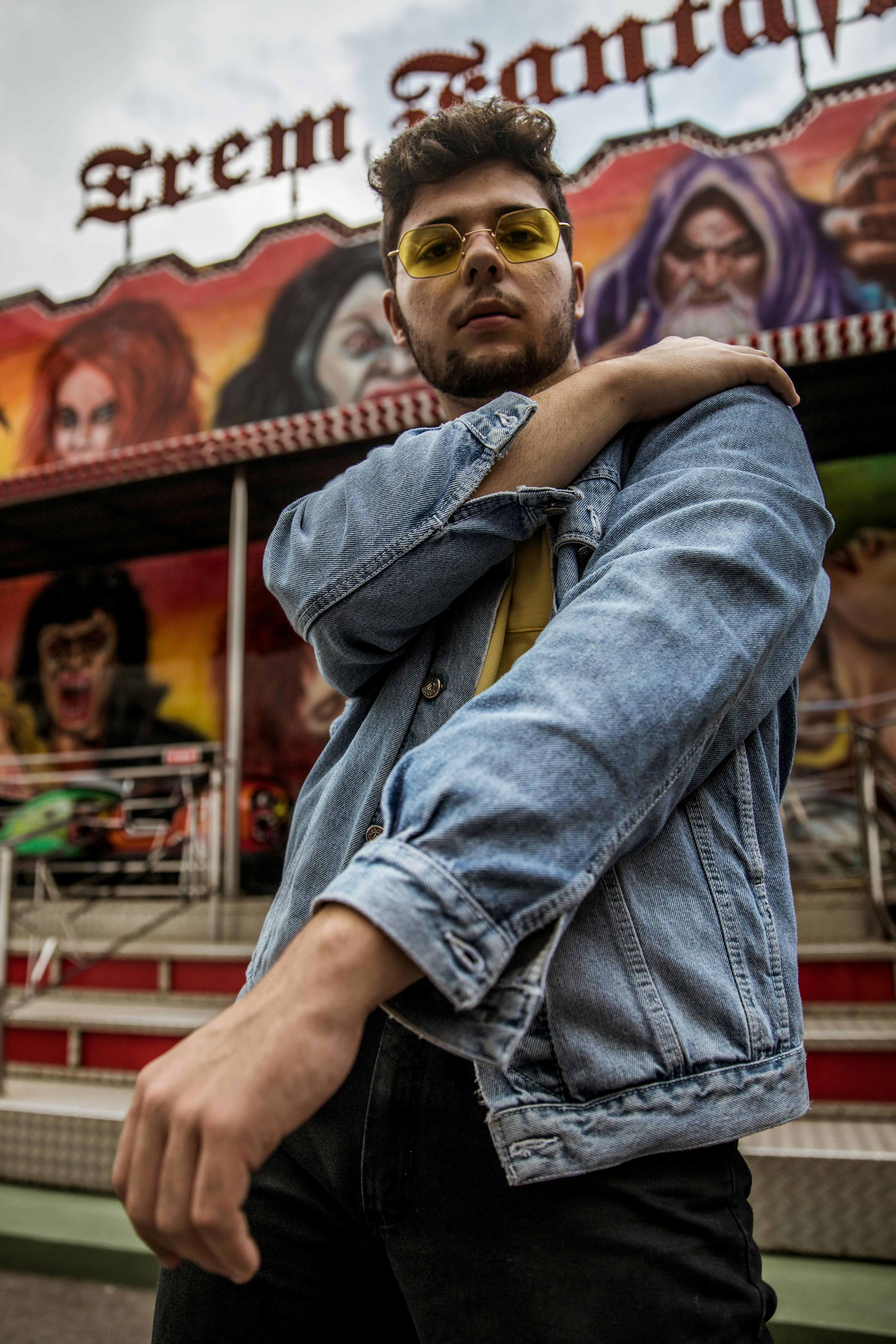 Man Holding Left Arm · Free Stock Photo