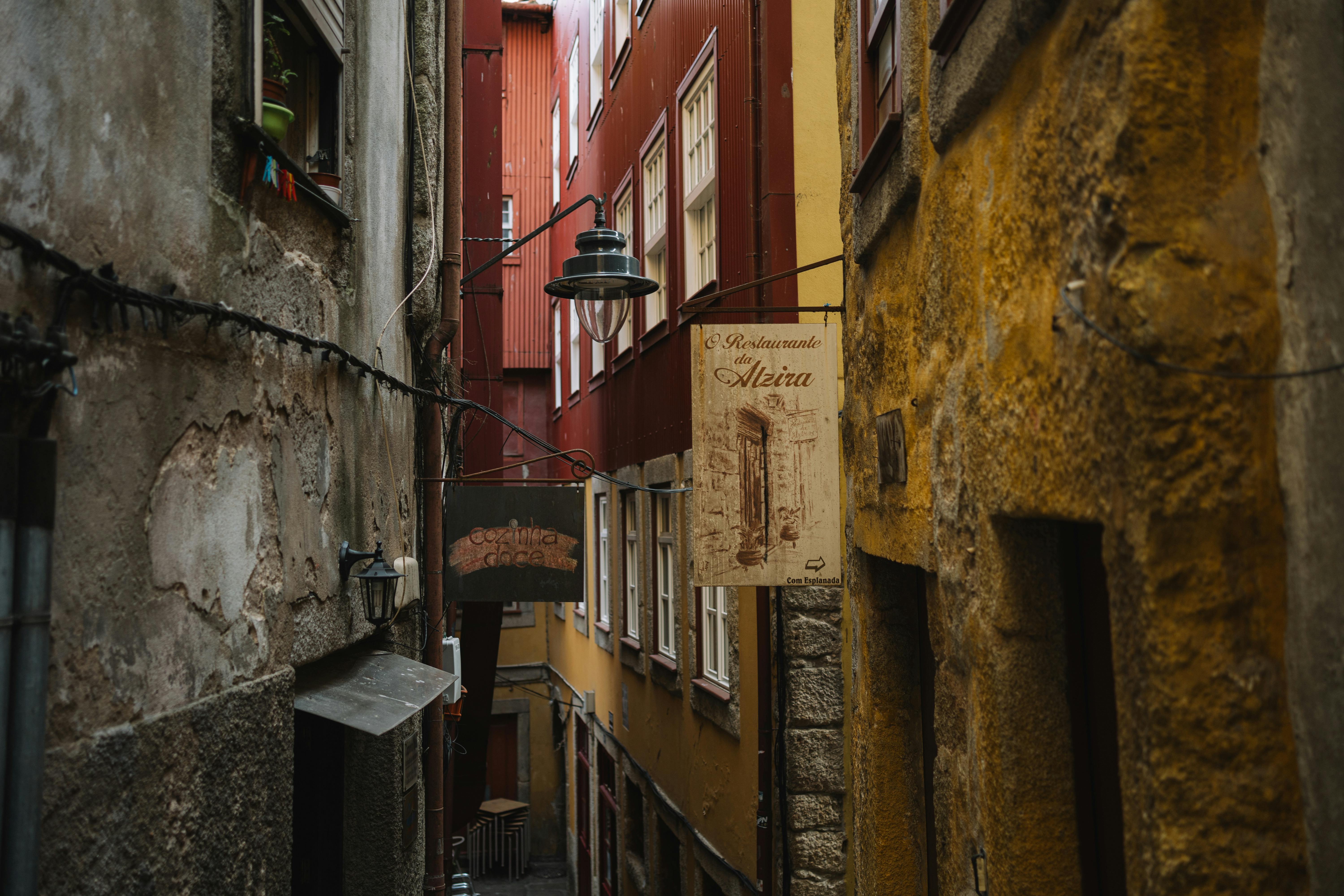 Narrow Alley of Apartment Buildings · Free Stock Photo