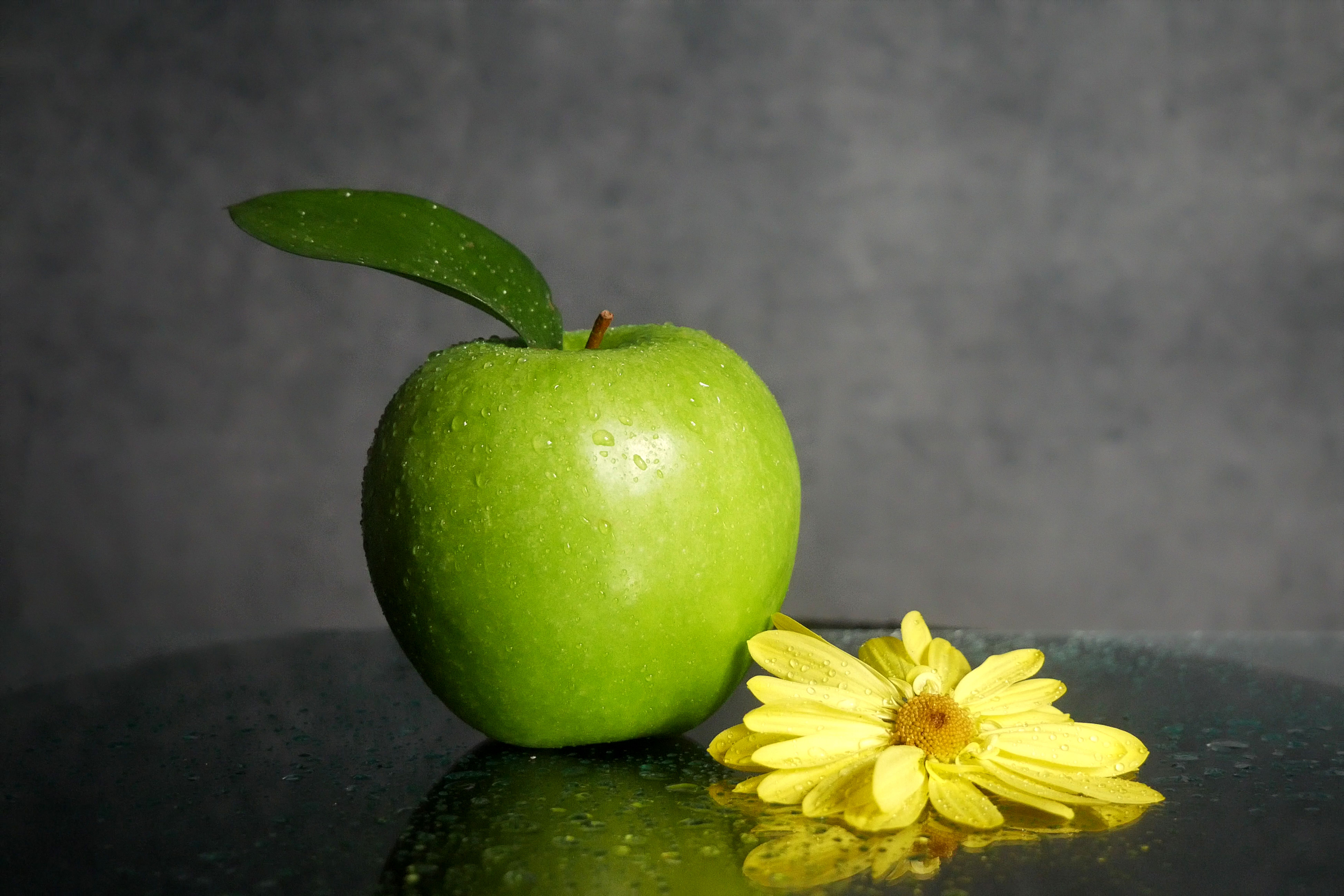 Green Apple by Yellow Flower · Free Stock Photo