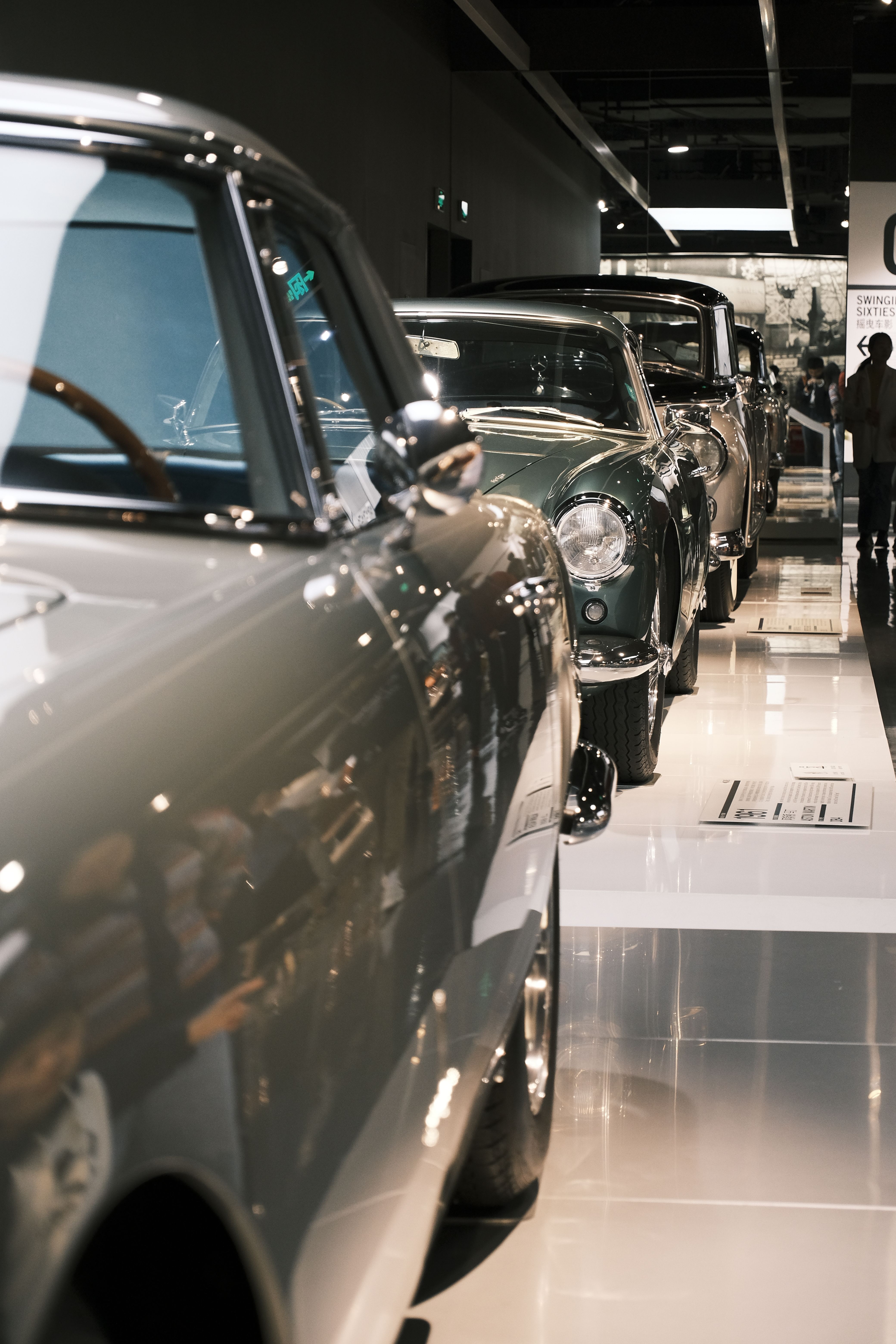 Classic Cars in a Showroom · Free Stock Photo