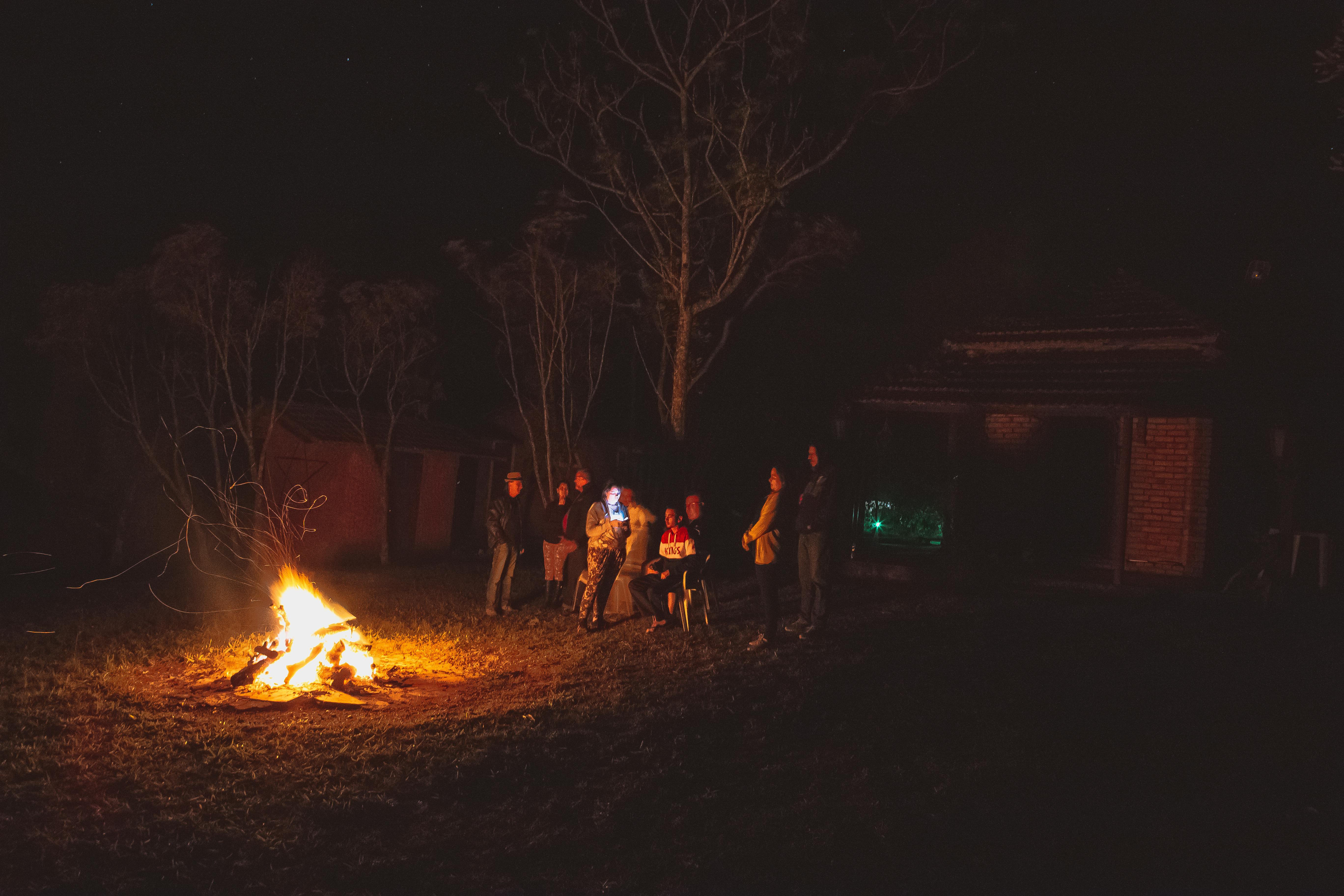 People Standing Near Bonfire during Nighttime · Free Stock Photo