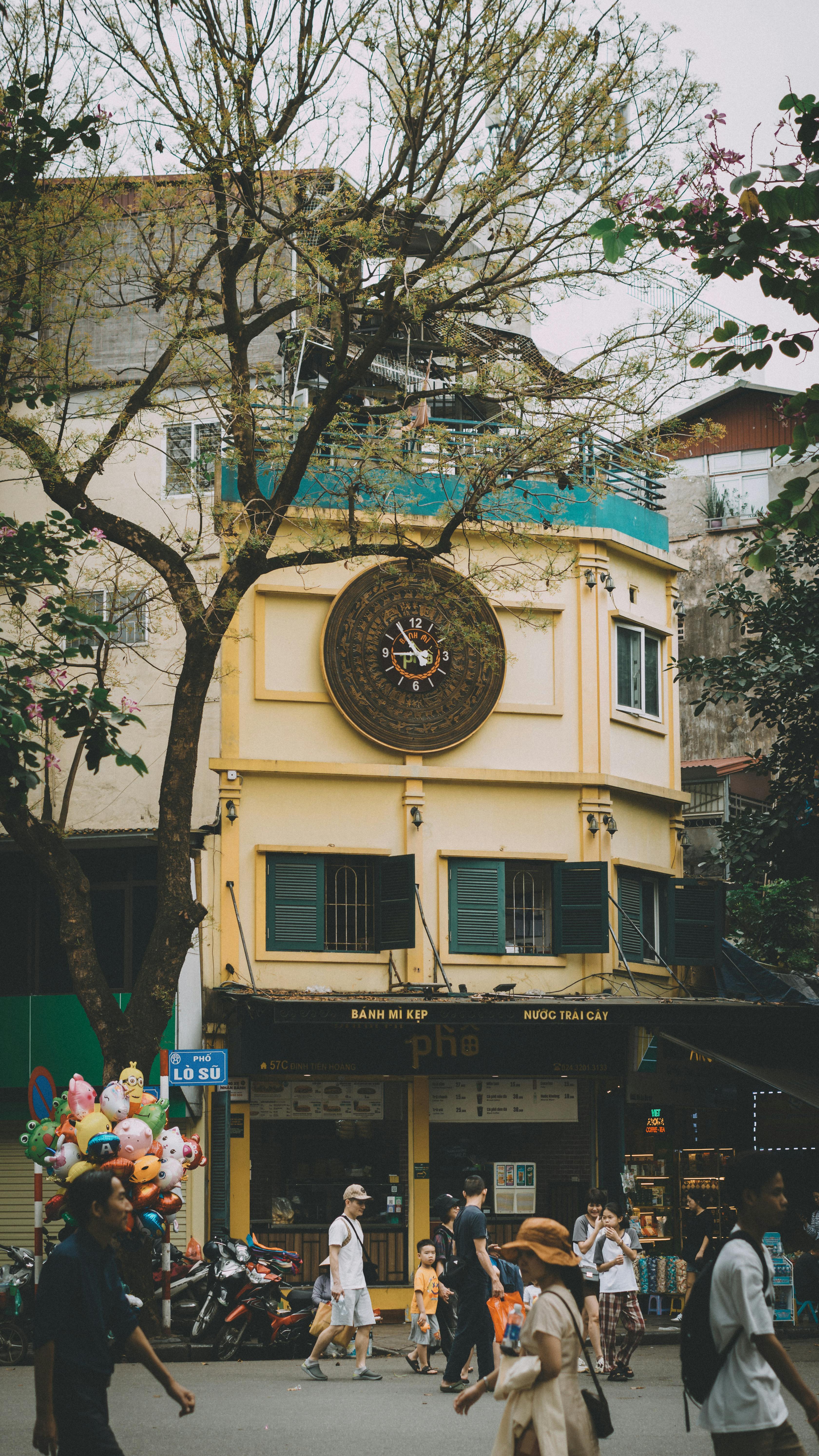 Clock on Yellow Building in Hanoi, Vietnam · Free Stock Photo