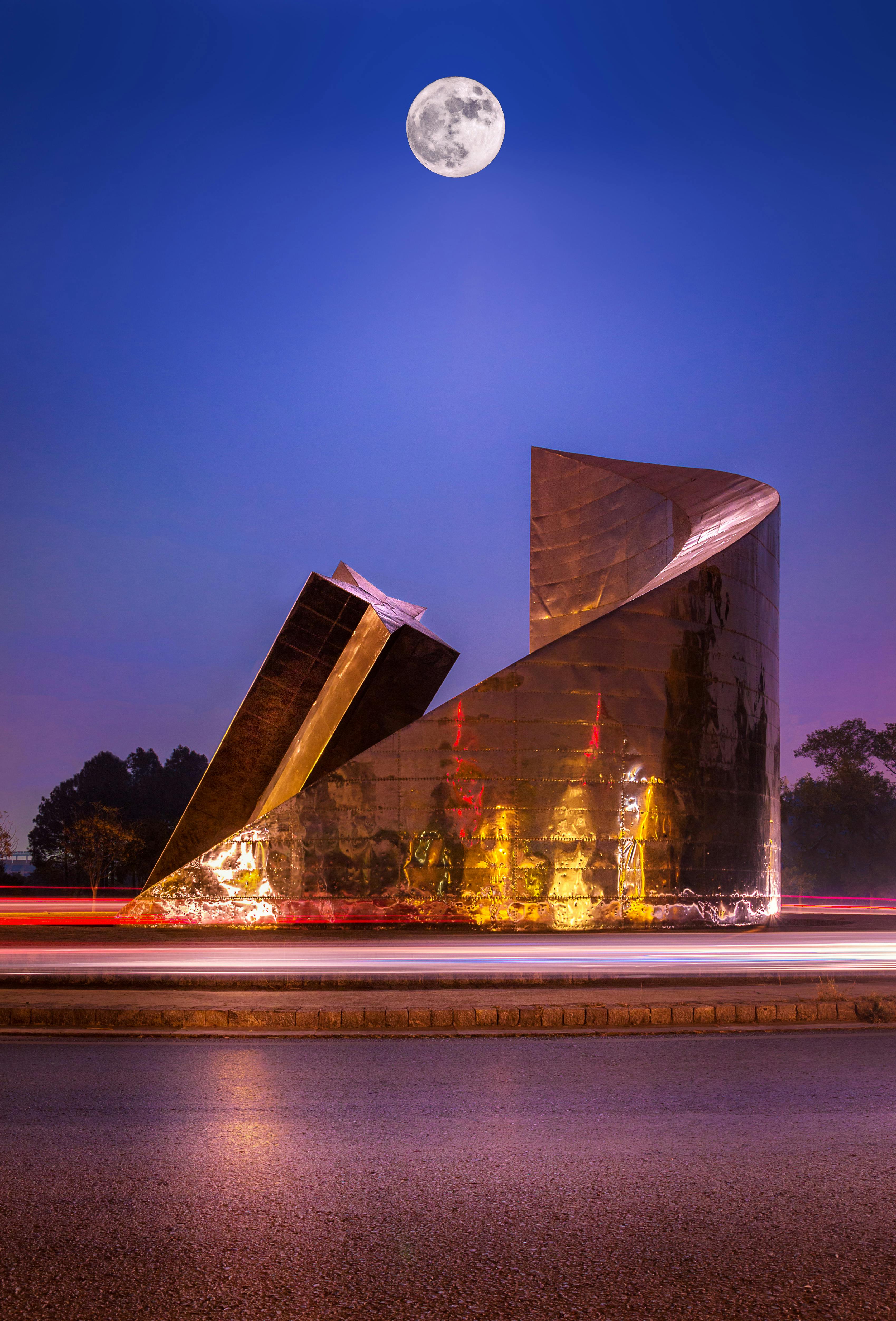Brown Building Under Full Moon · Free Stock Photo