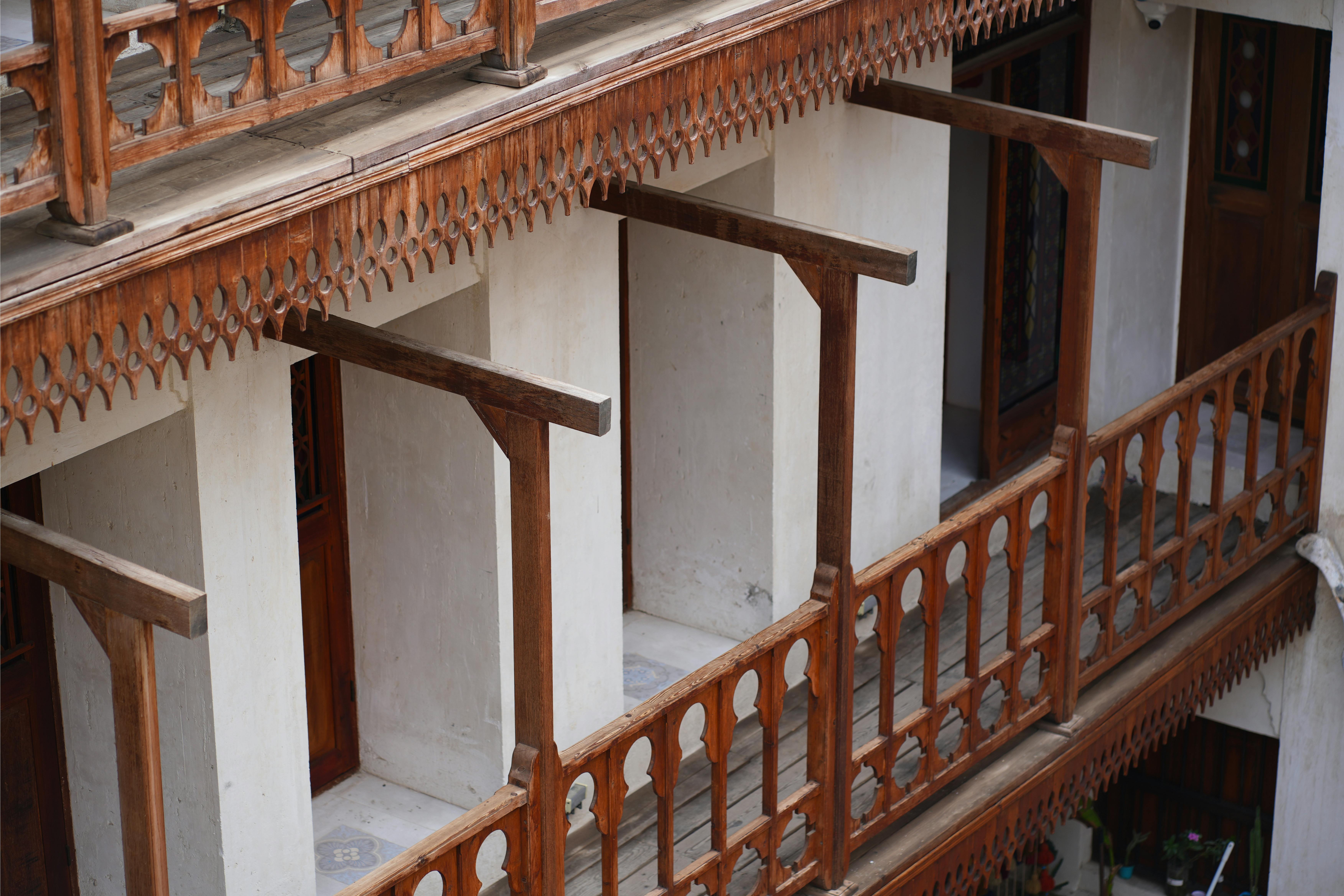 Wooden Planks and Railing on Vintage Building Balcony · Free Stock Photo