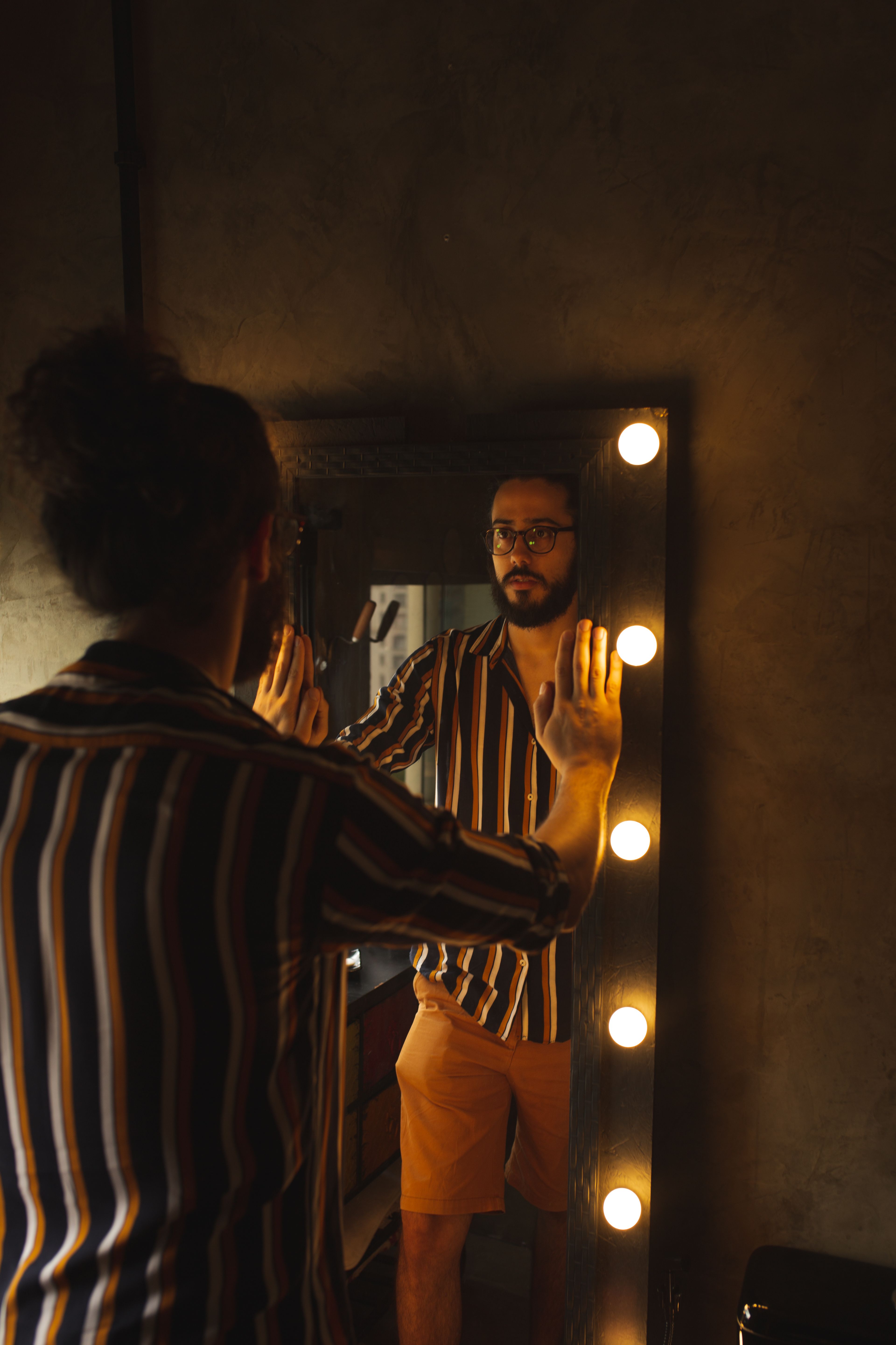 Man Holding Rectangular Mirror · Free Stock Photo