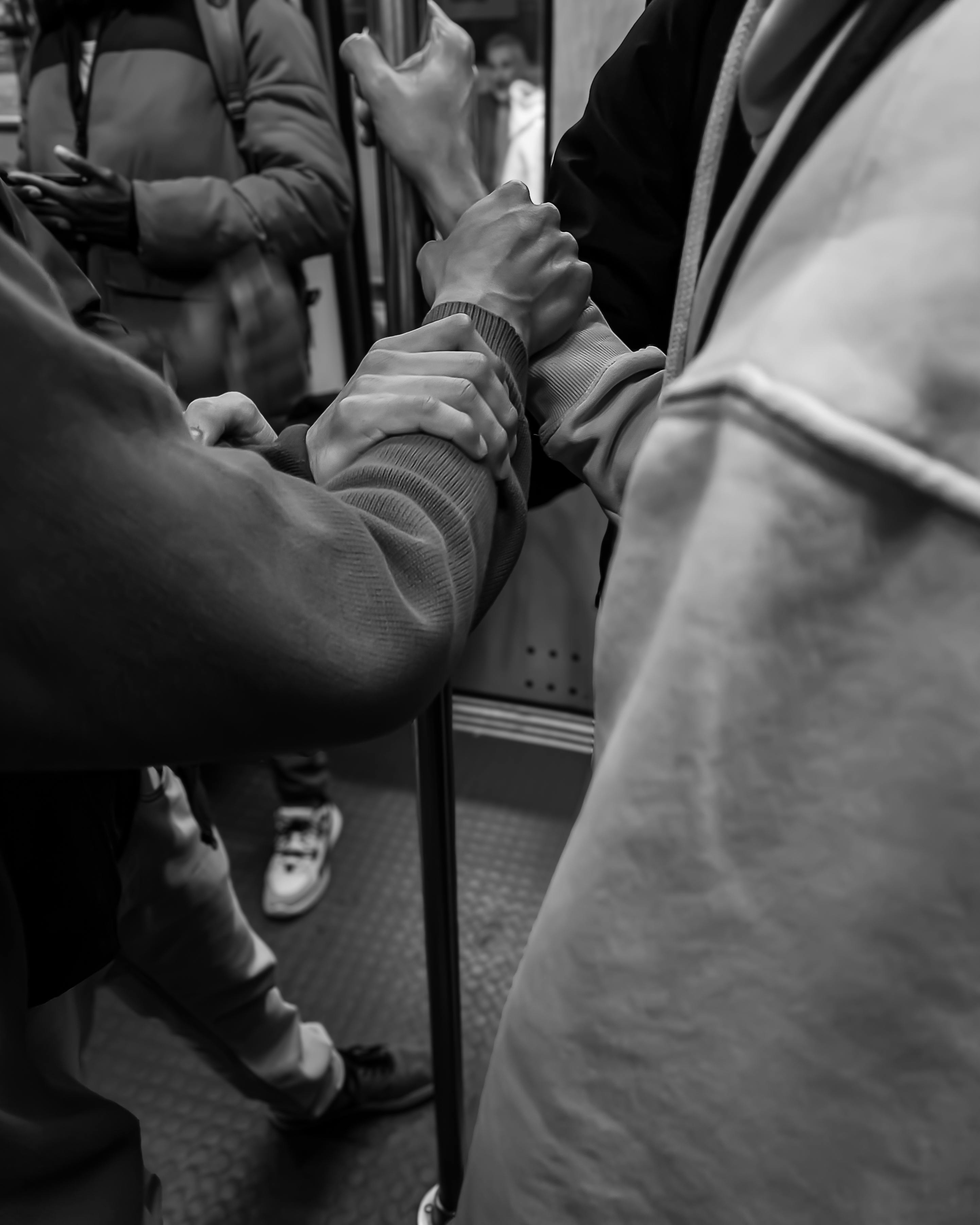 People Holding Handrail on Public Transportation · Free Stock Photo