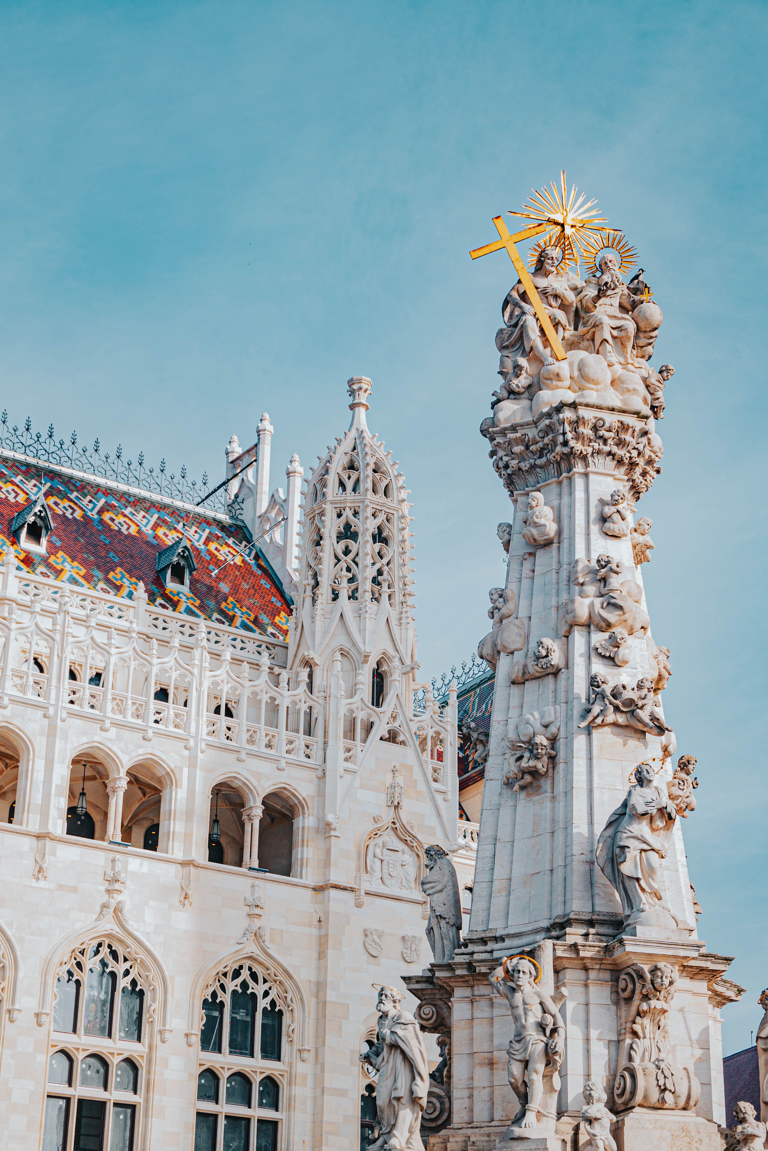 Ornamented Column with Sculptures near Vienna Cathedral · Free Stock Photo