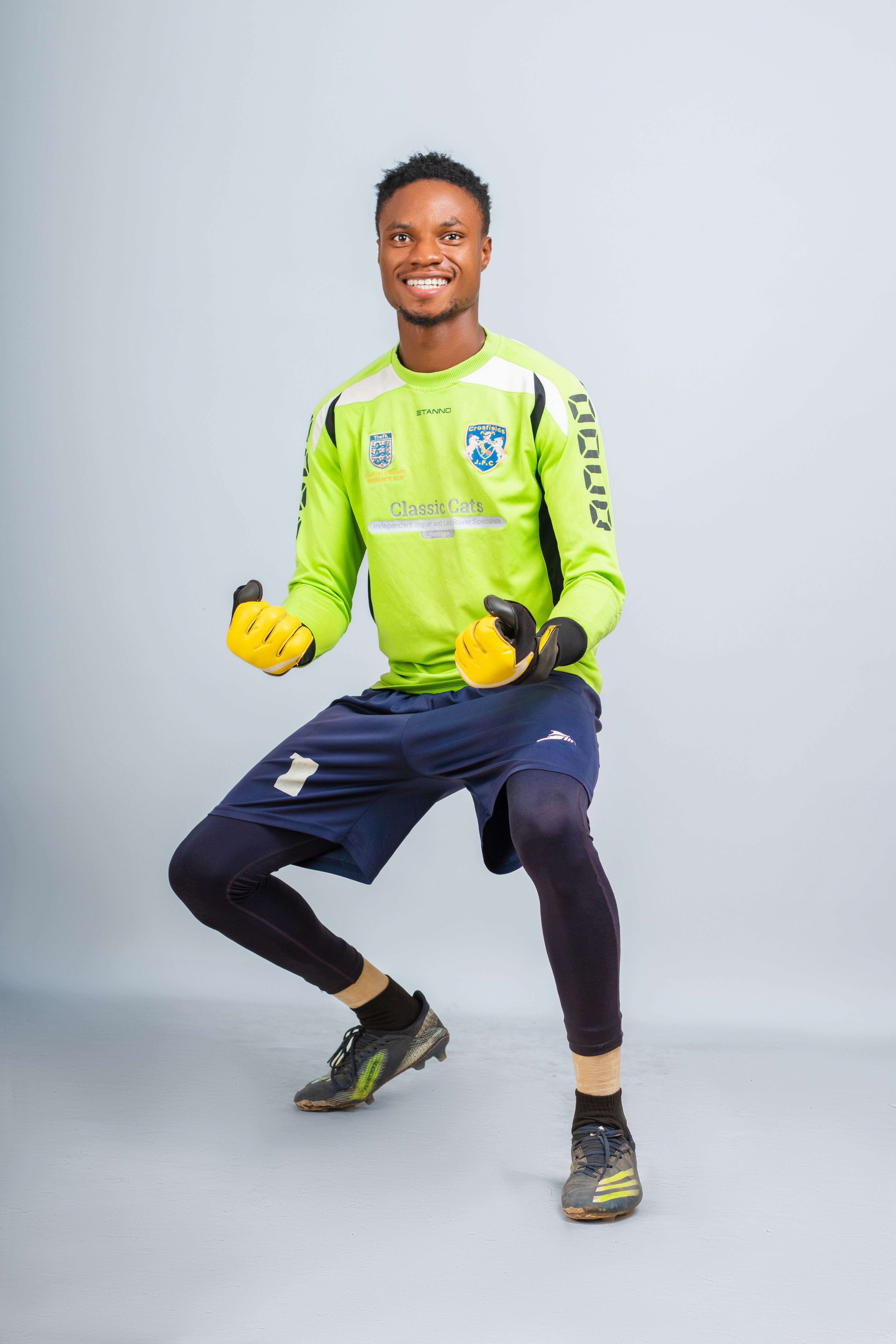 Goalkeeper Posing in a Studio · Free Stock Photo