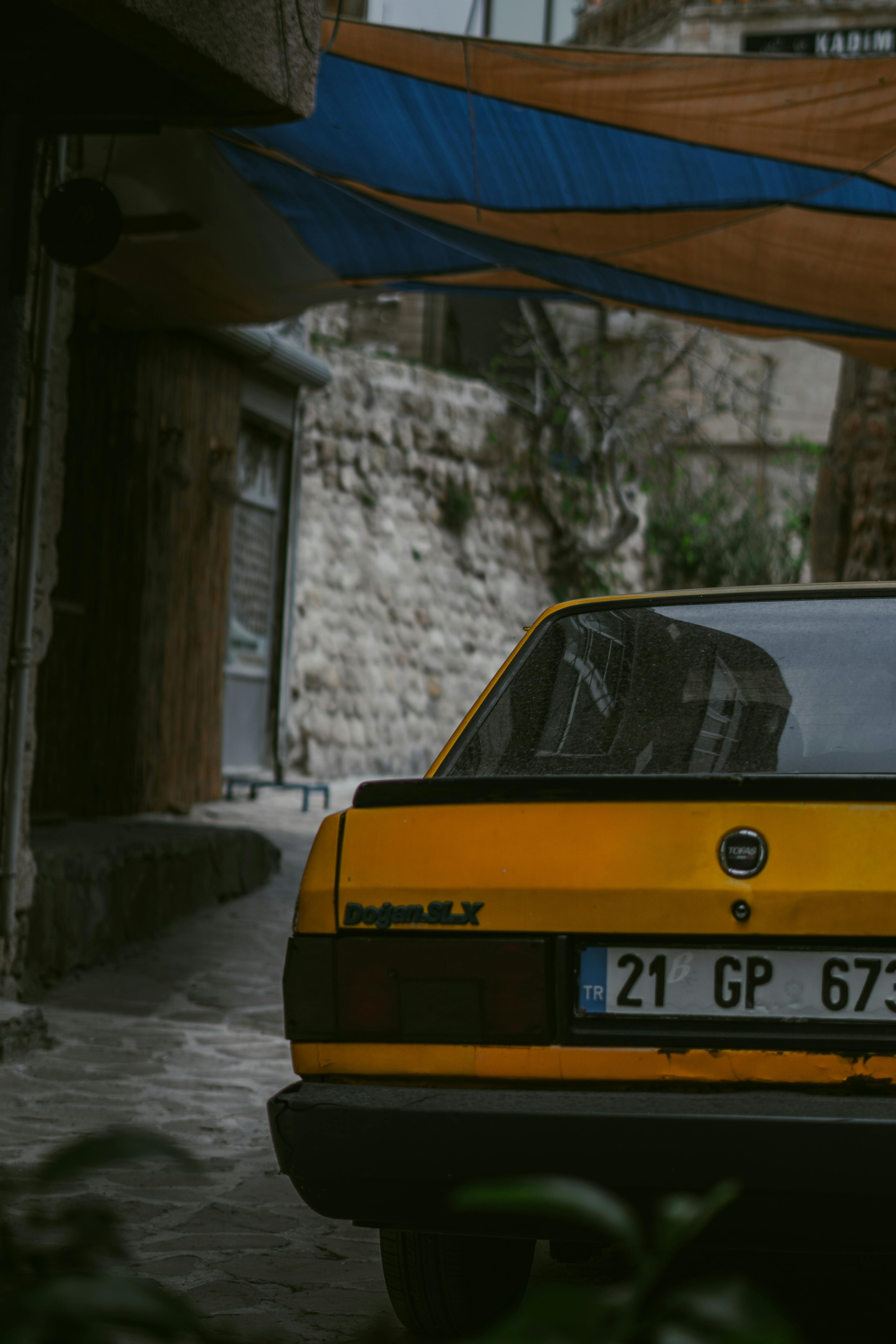 Yellow Dogan Car in Turkey · Free Stock Photo