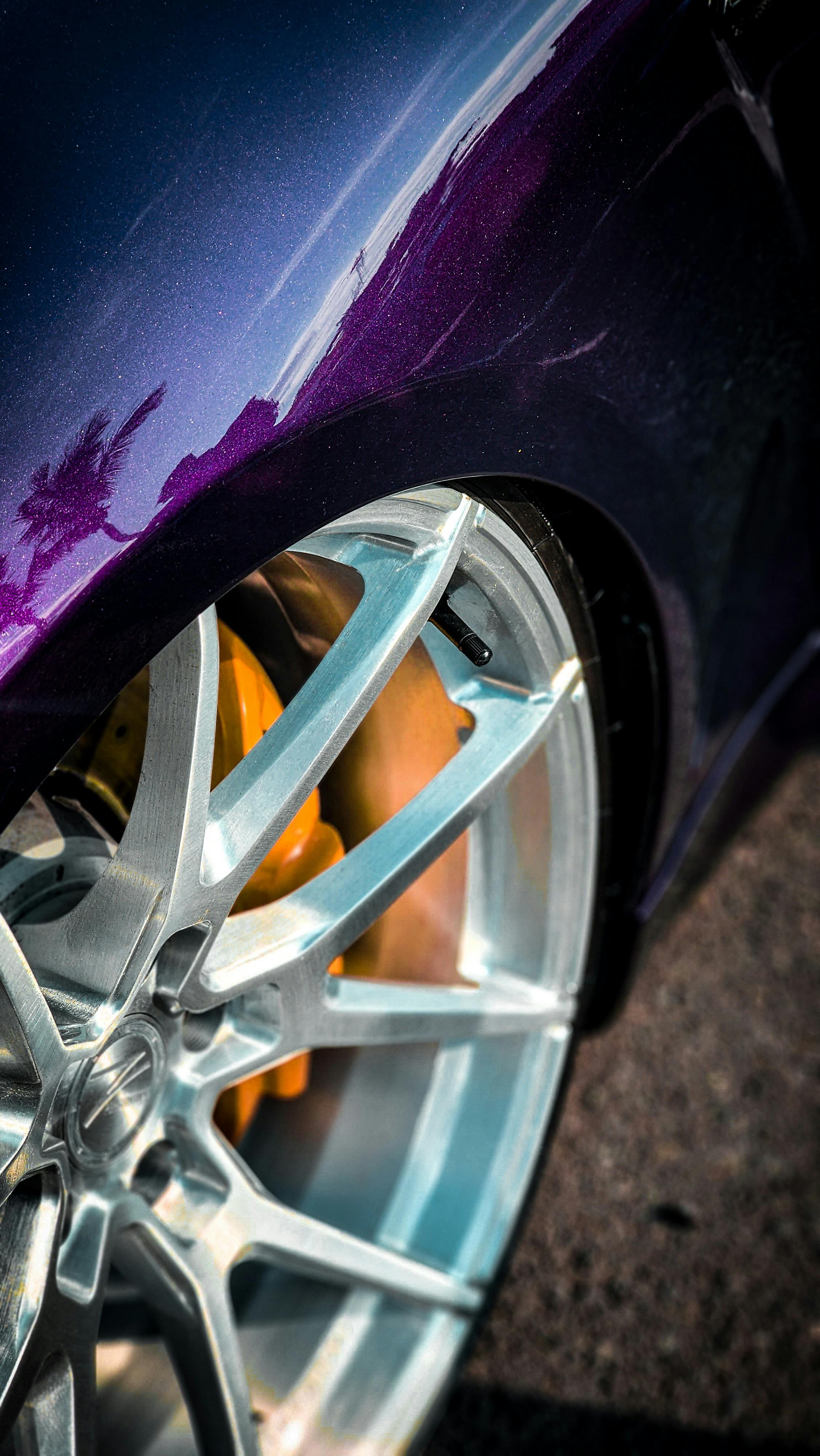 Wheel Rim of Purple Car · Free Stock Photo