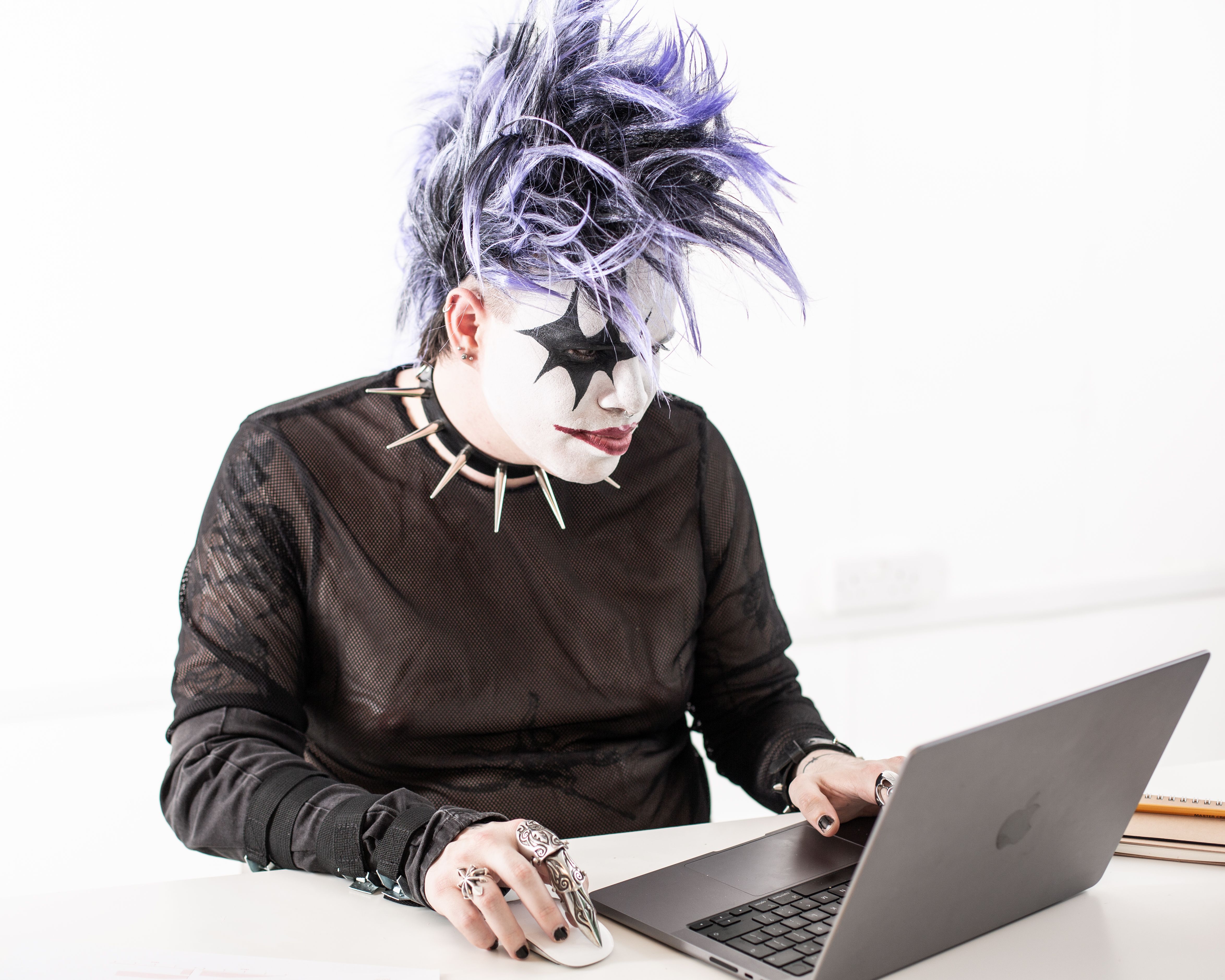 Man in Joker Costume Working on Laptop · Free Stock Photo