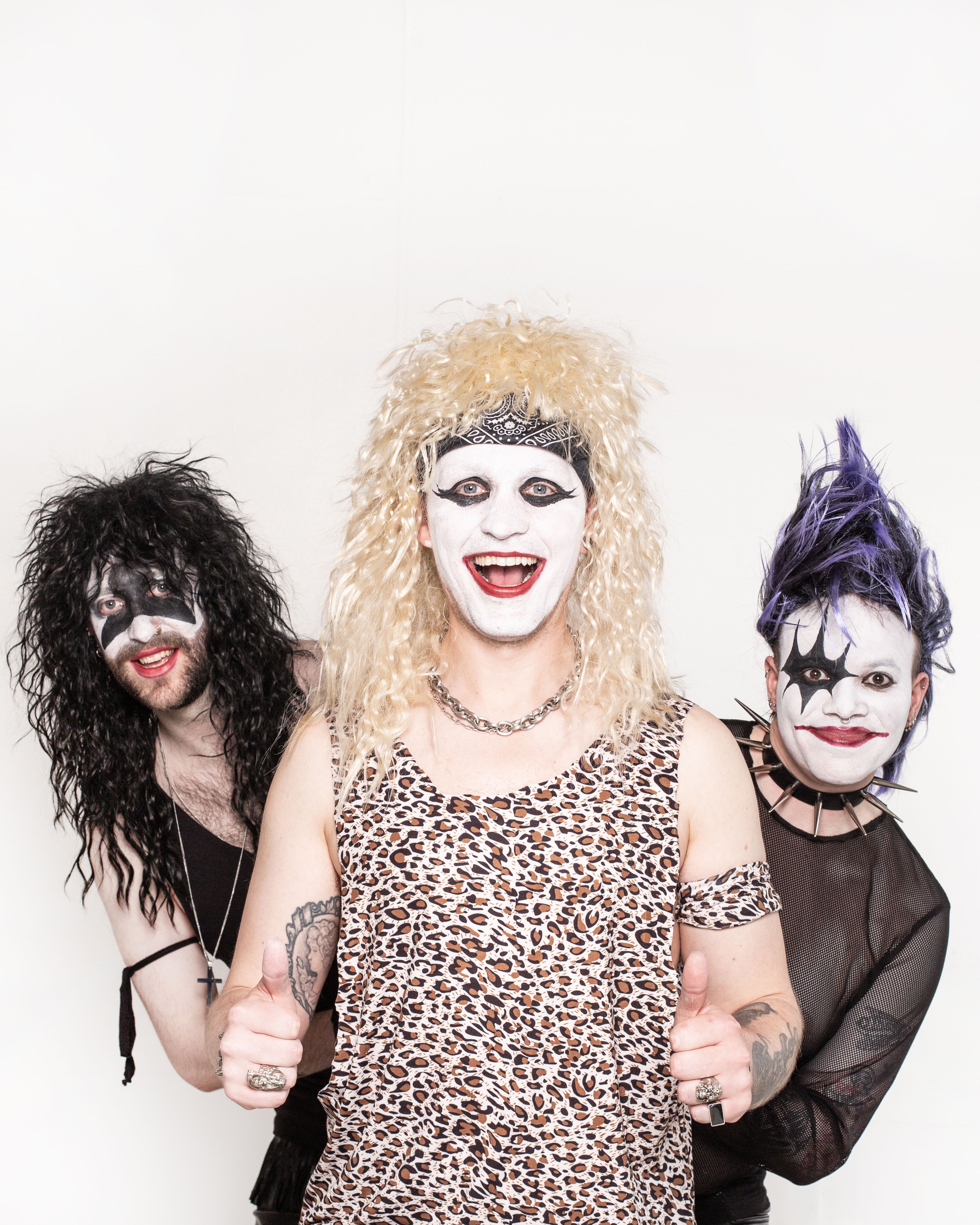 A Group of Men Wearing Goth Style Clothes and Makeup · Free Stock Photo