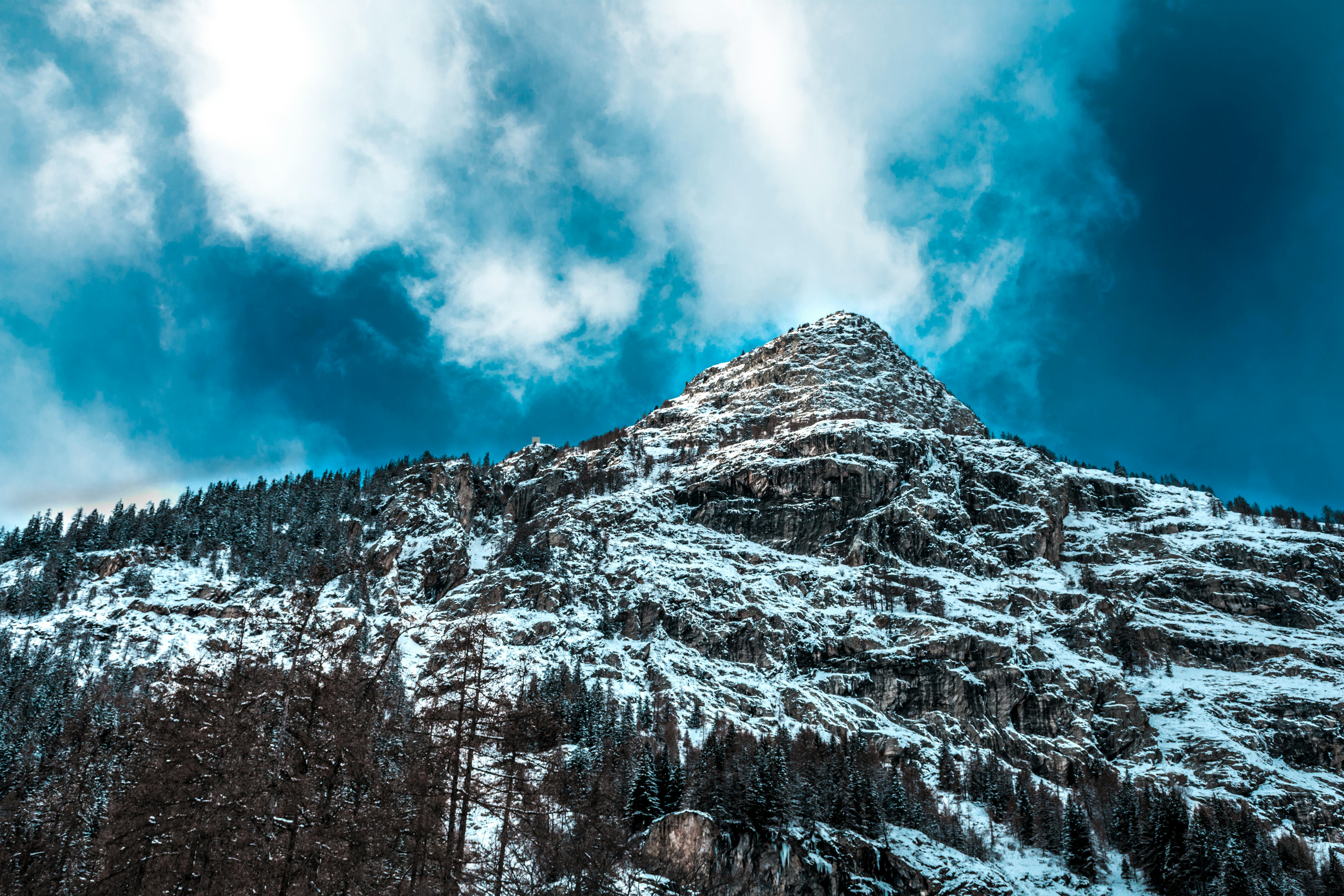 Low Angle Photography of Mountain Covered Snow · Free Stock Photo