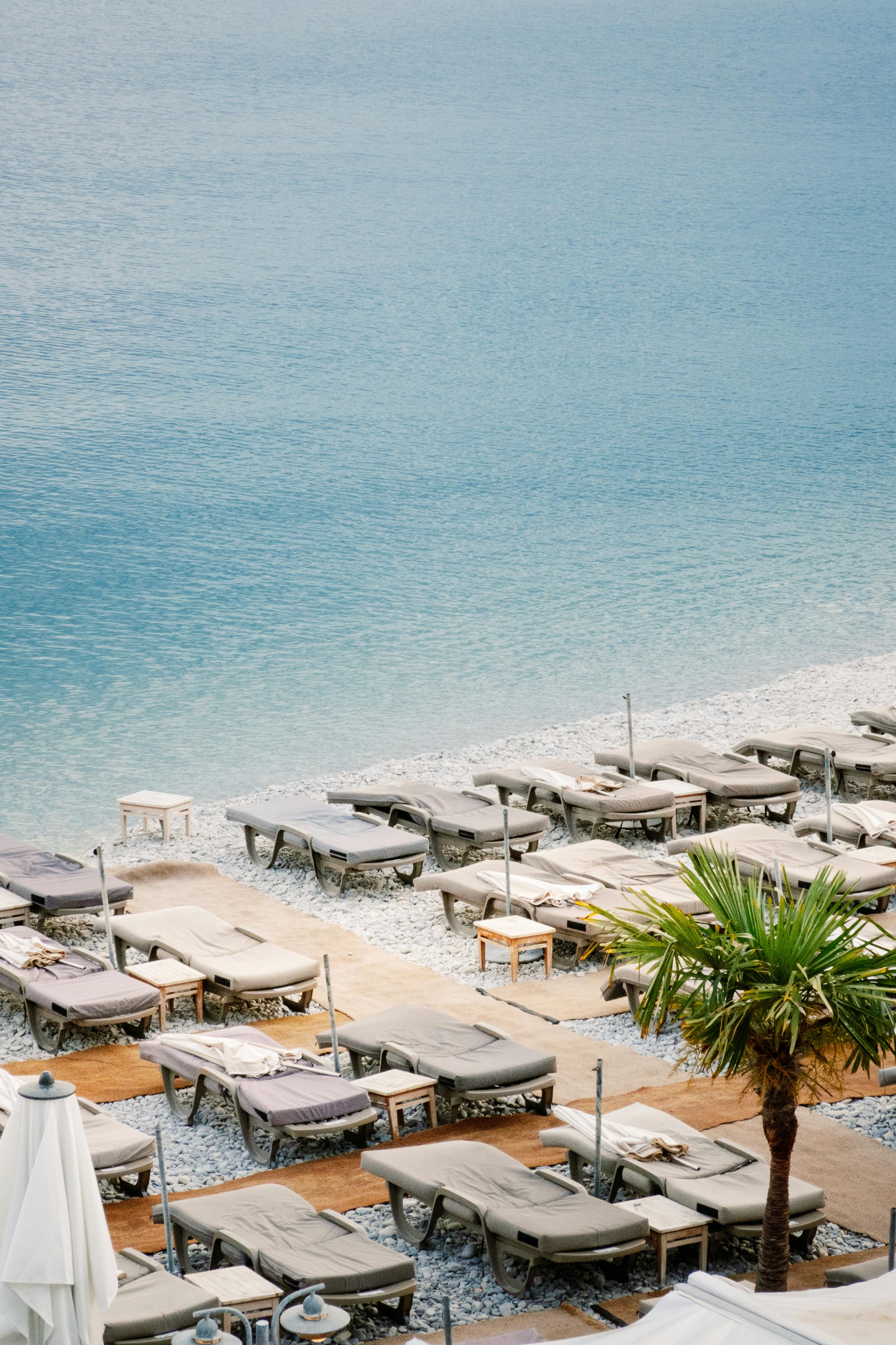 Aerial View of Sunbeds on a Beach · Free Stock Photo