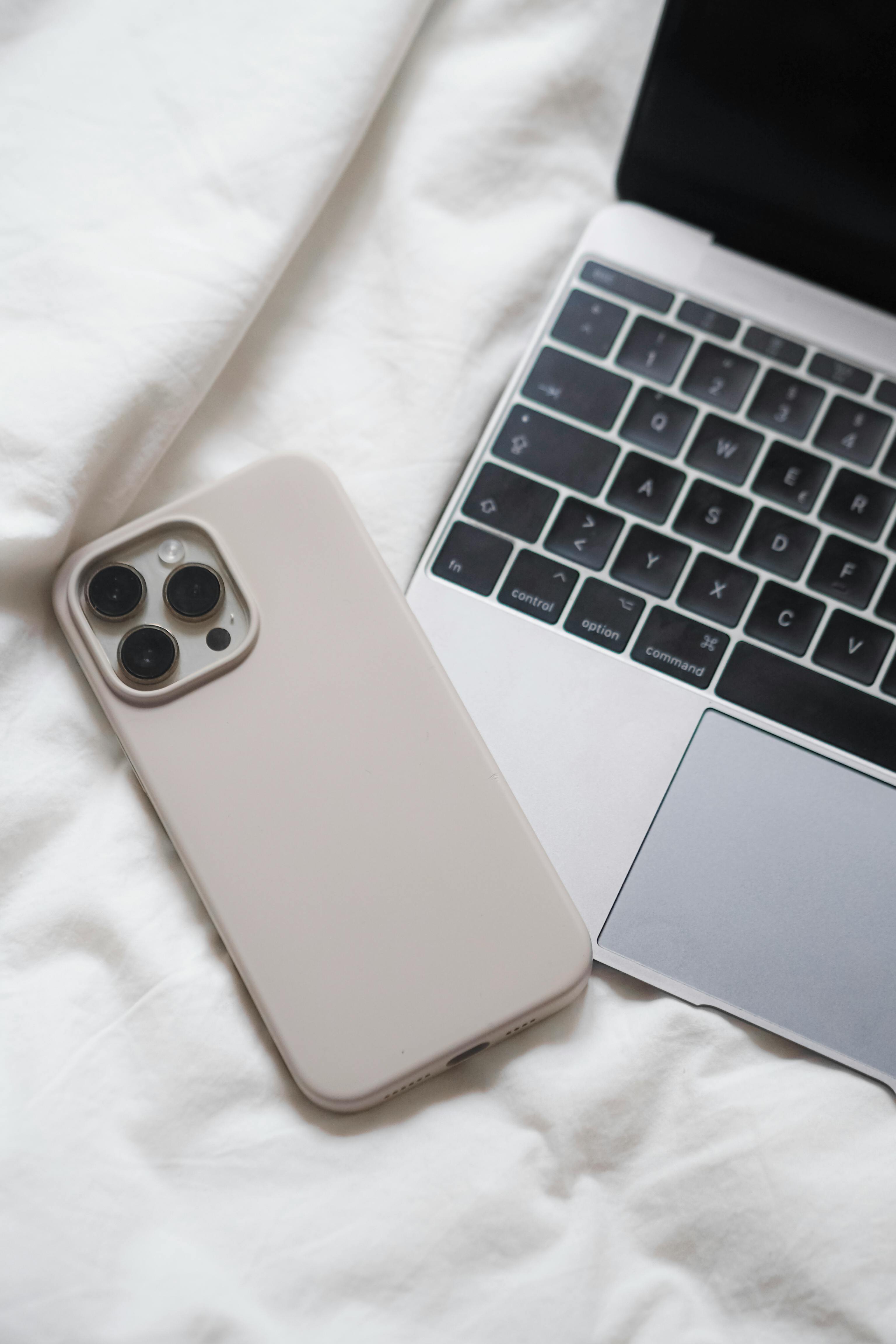 Photo Of Phone Beside Laptop · Free Stock Photo