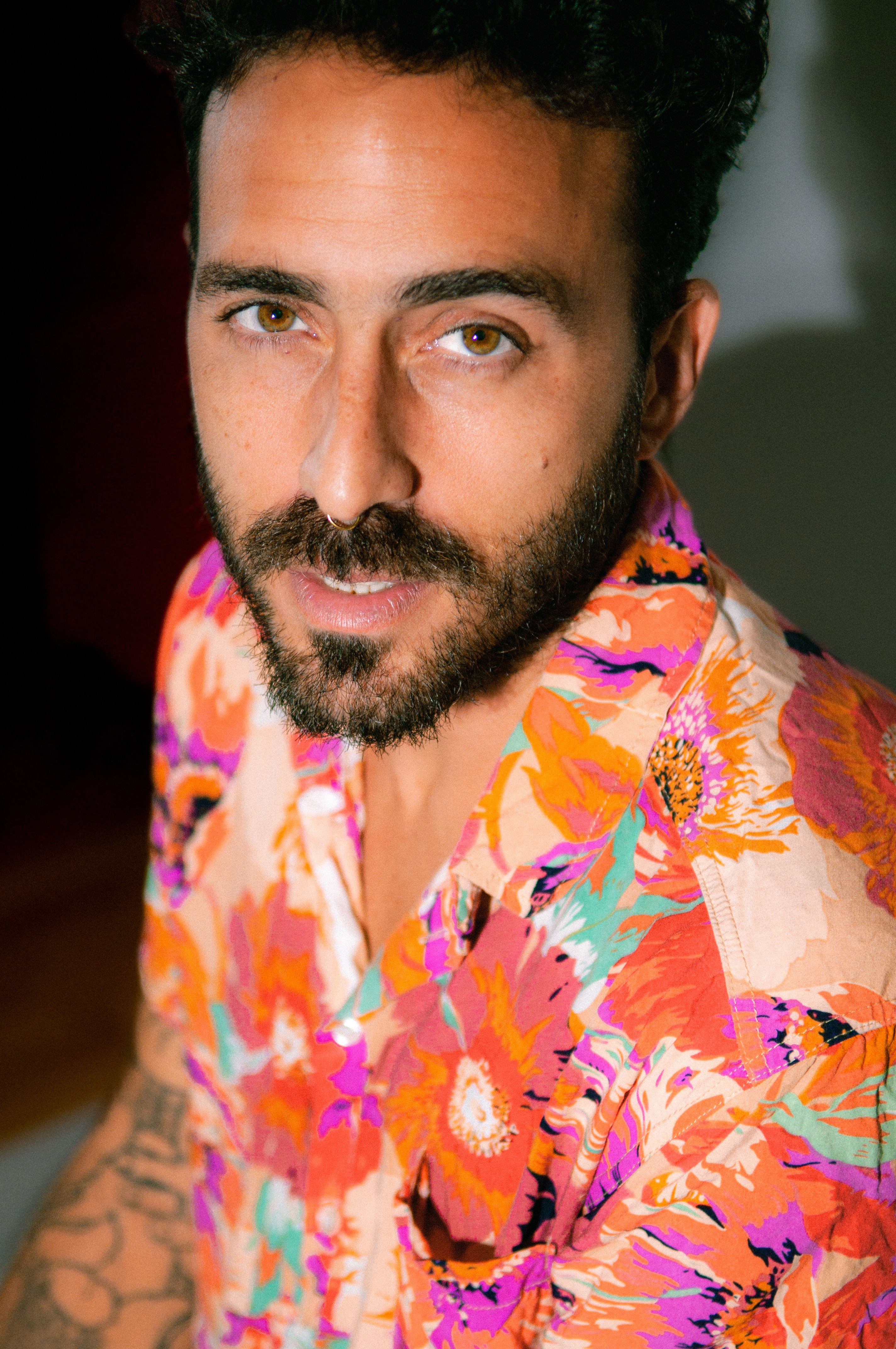 Portrait of Man Wearing Colorful Shirt · Free Stock Photo