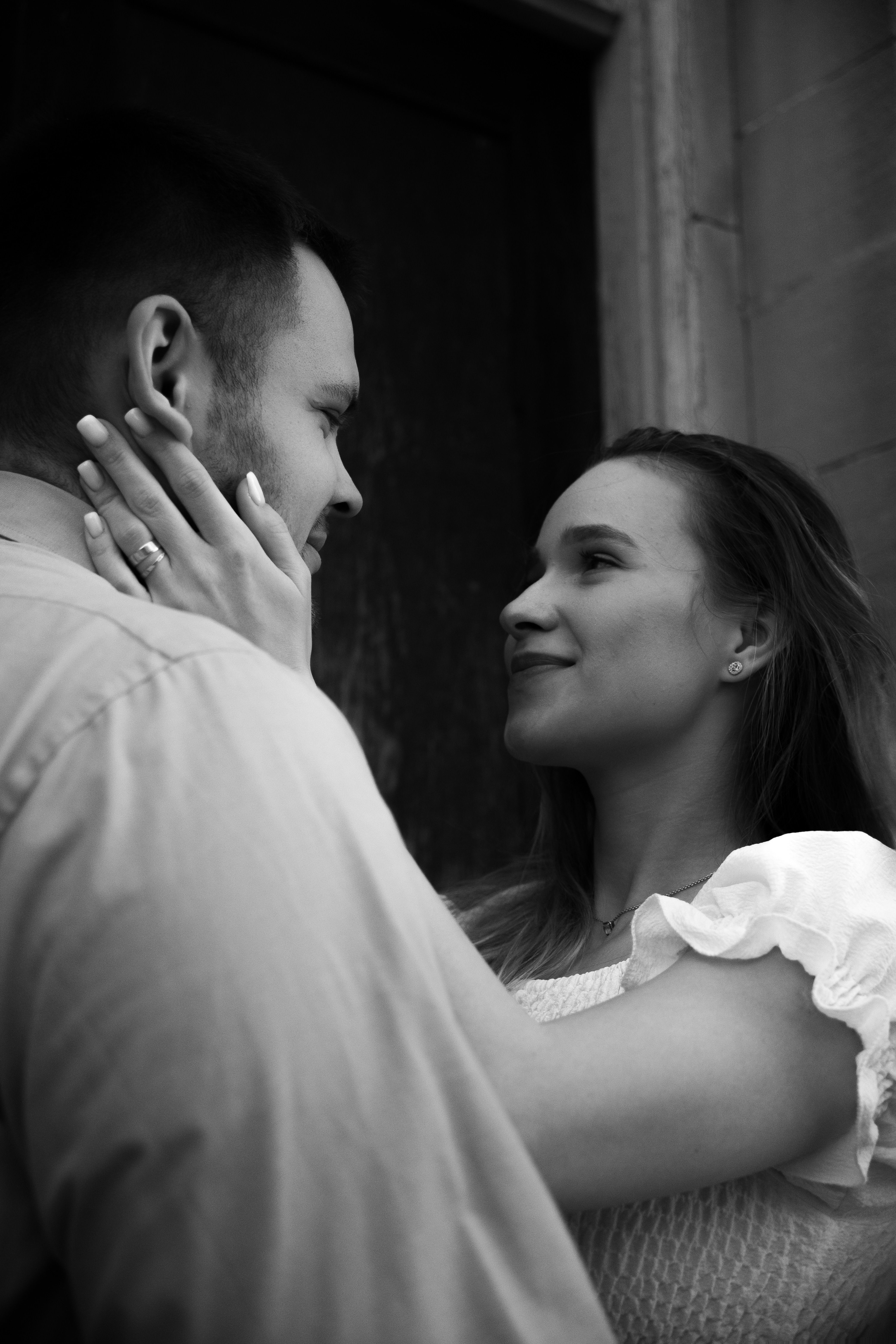 Black and White Photo of Woman Caressing Mans Cheek · Free Stock Photo