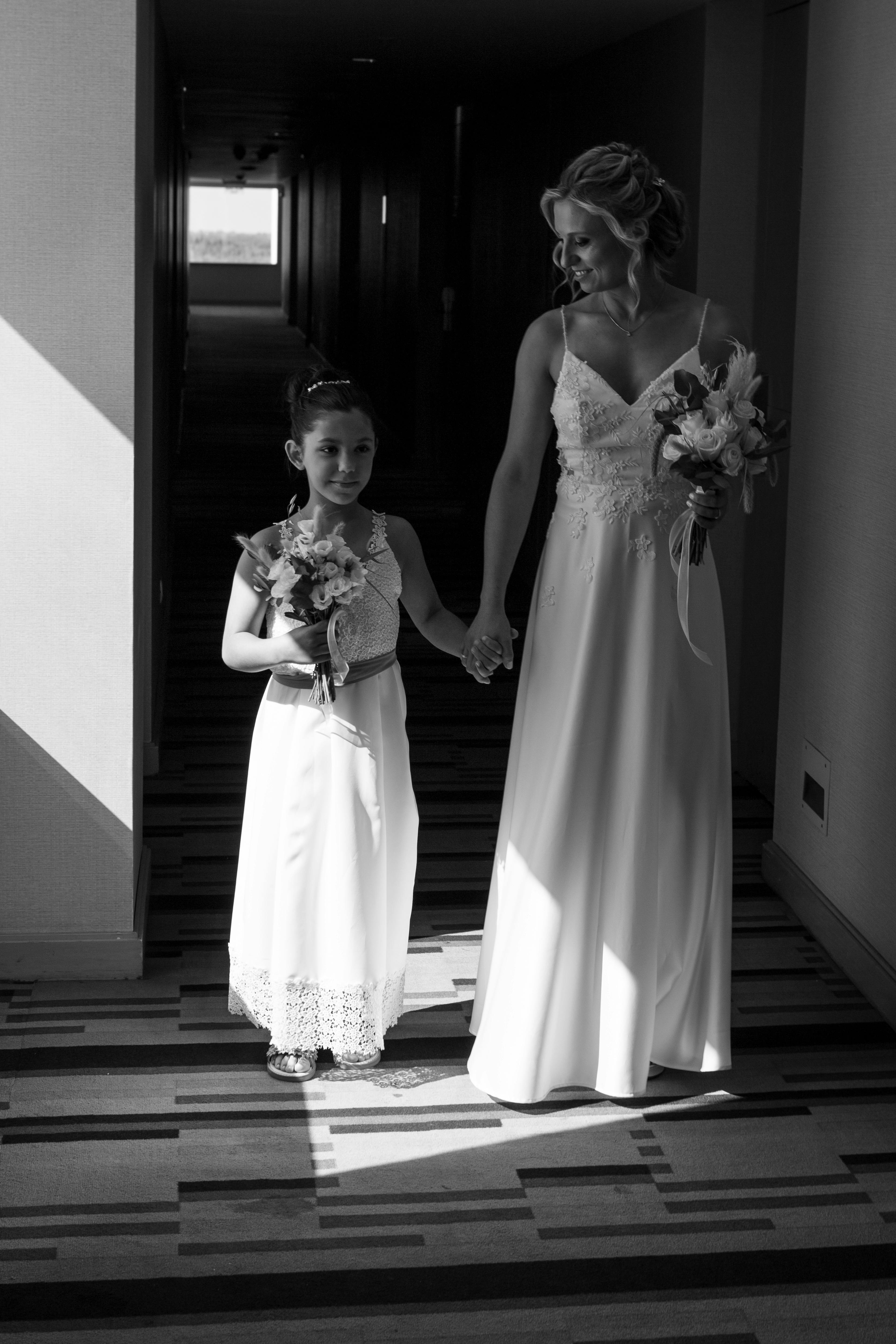 Bride with a Child in Black and White · Free Stock Photo