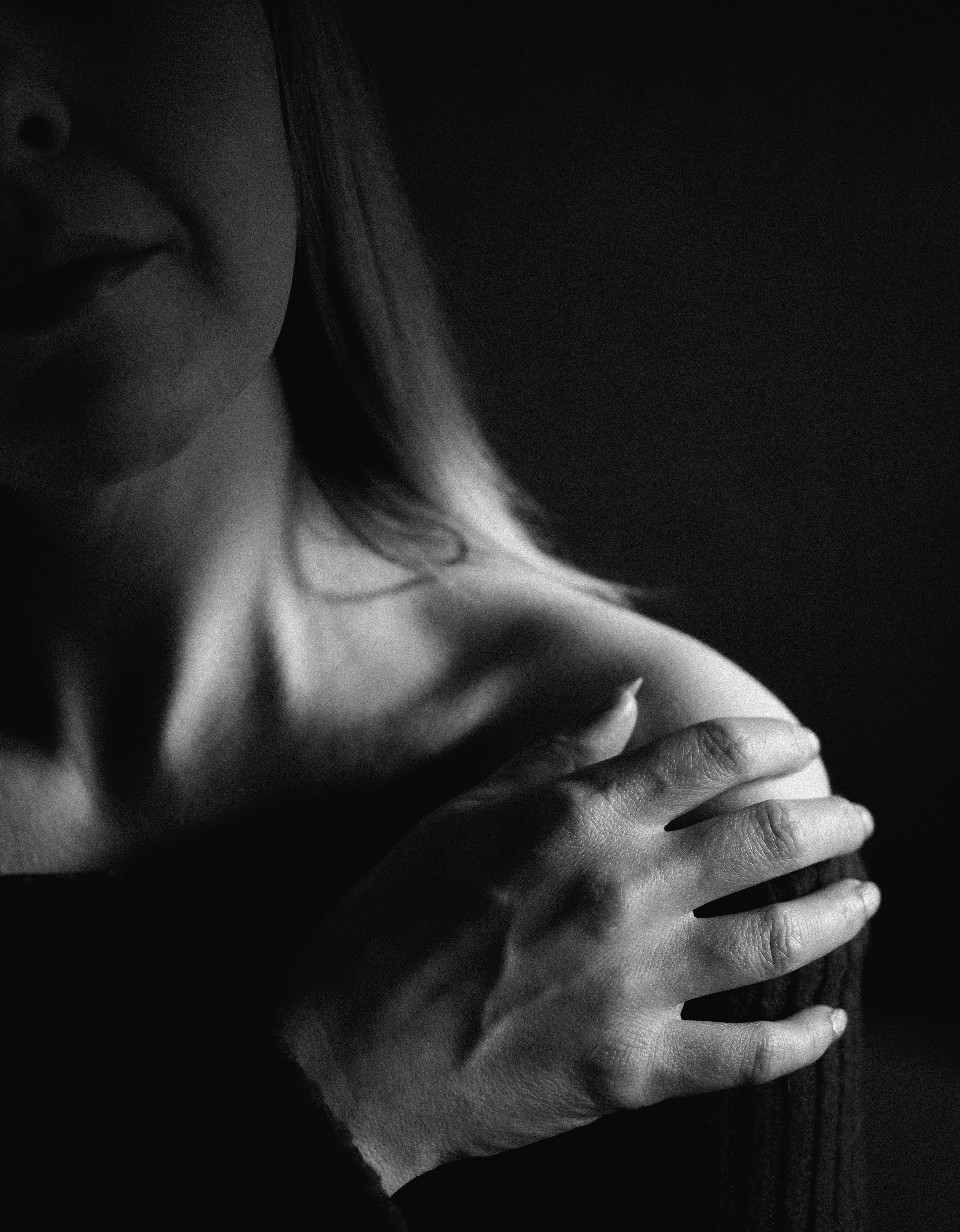 Woman Holding Hand on Shoulder · Free Stock Photo