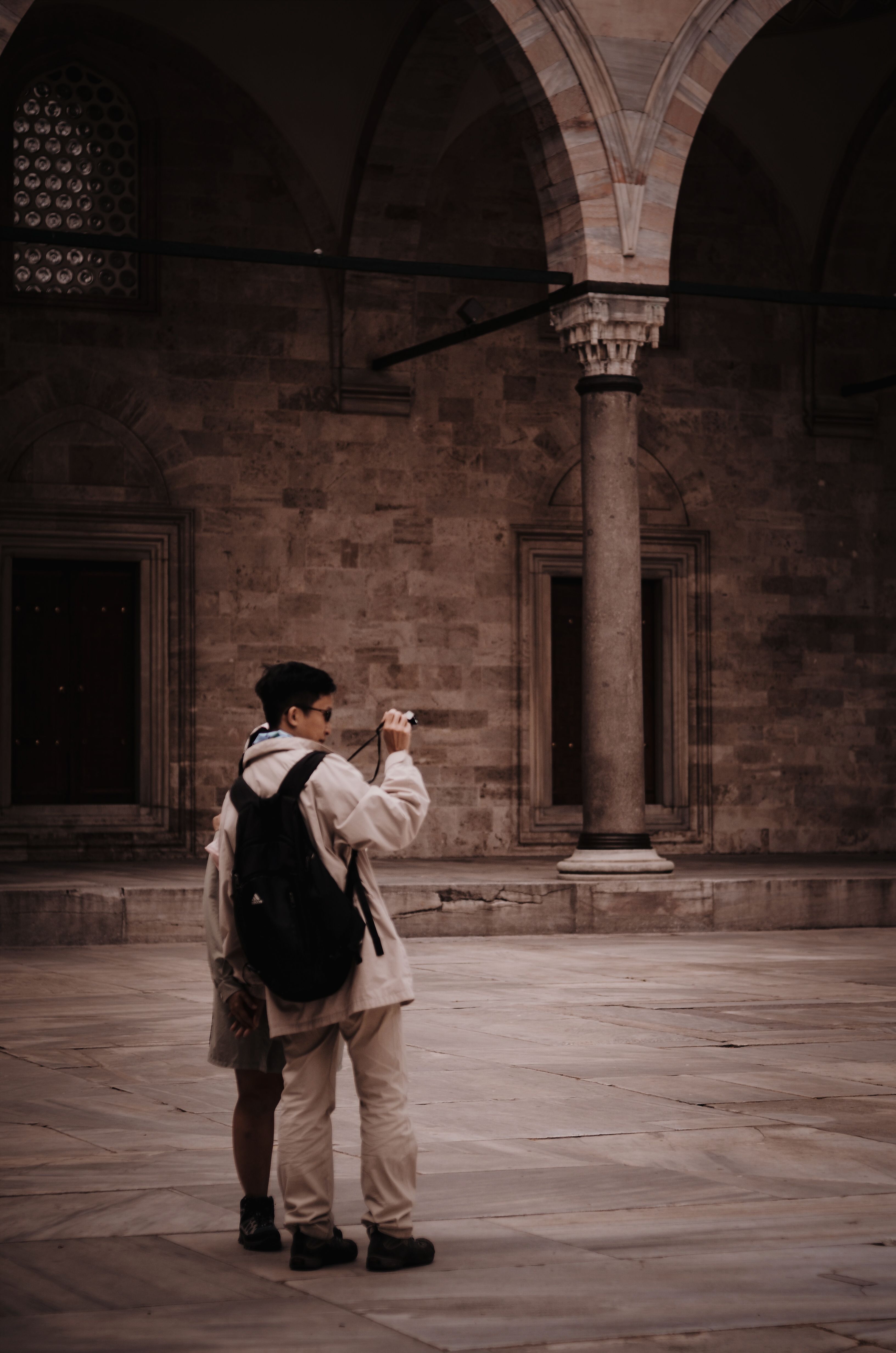 Man Standing Near Building · Free Stock Photo