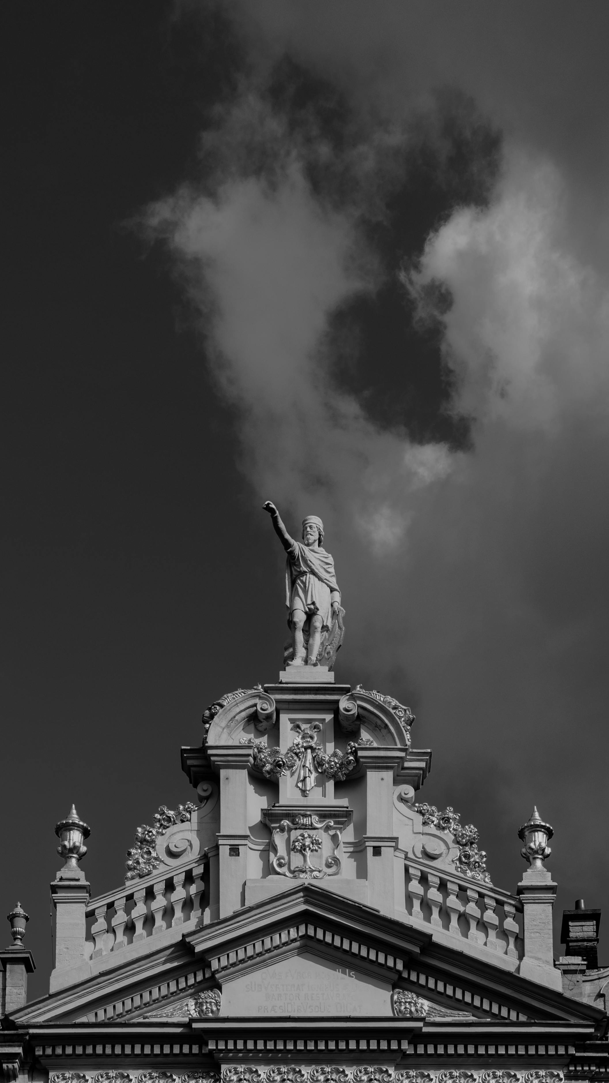 Sculpture on Building Rooftop · Free Stock Photo
