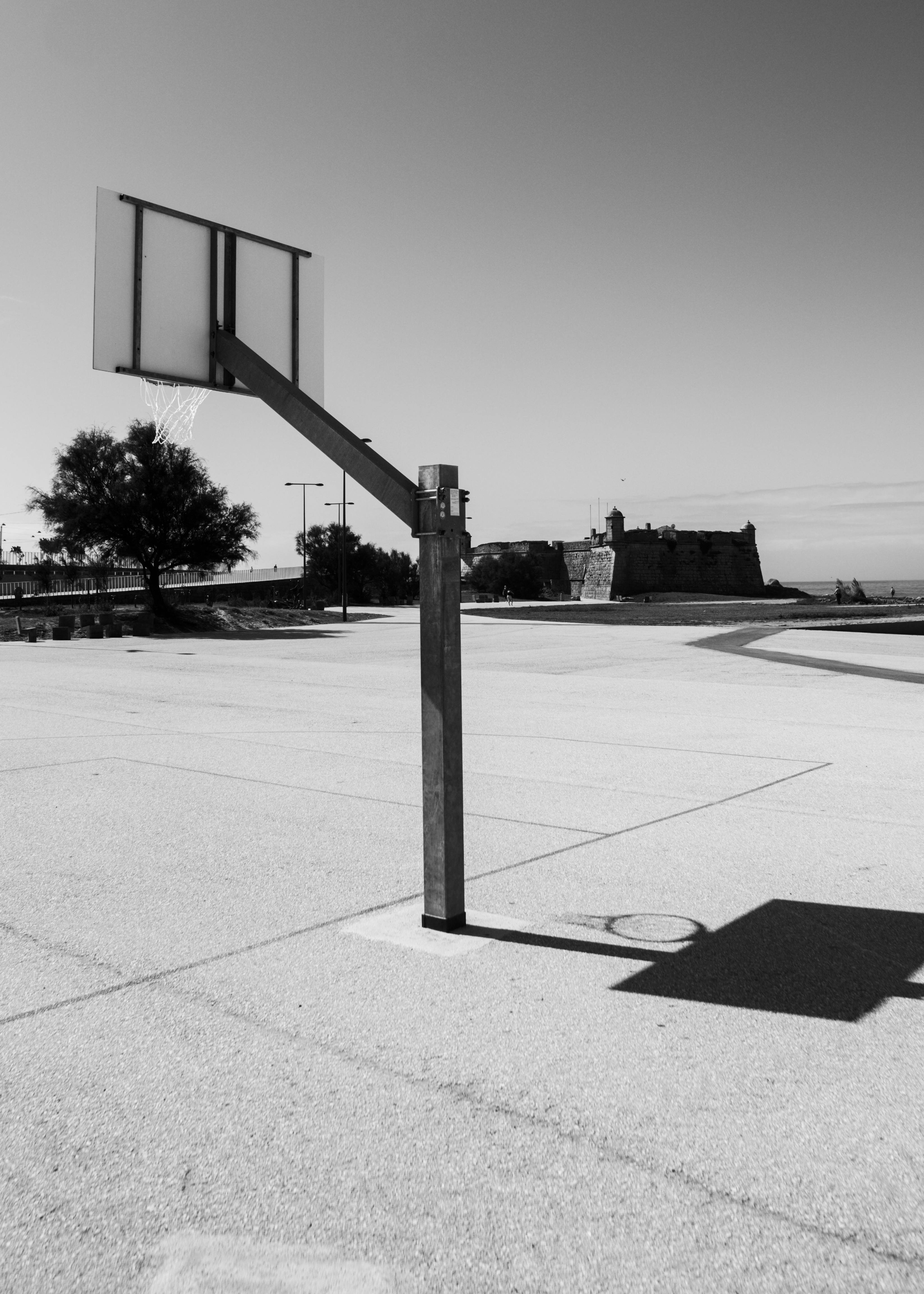 Shadow of basketball hoop on wall · Free Stock Photo
