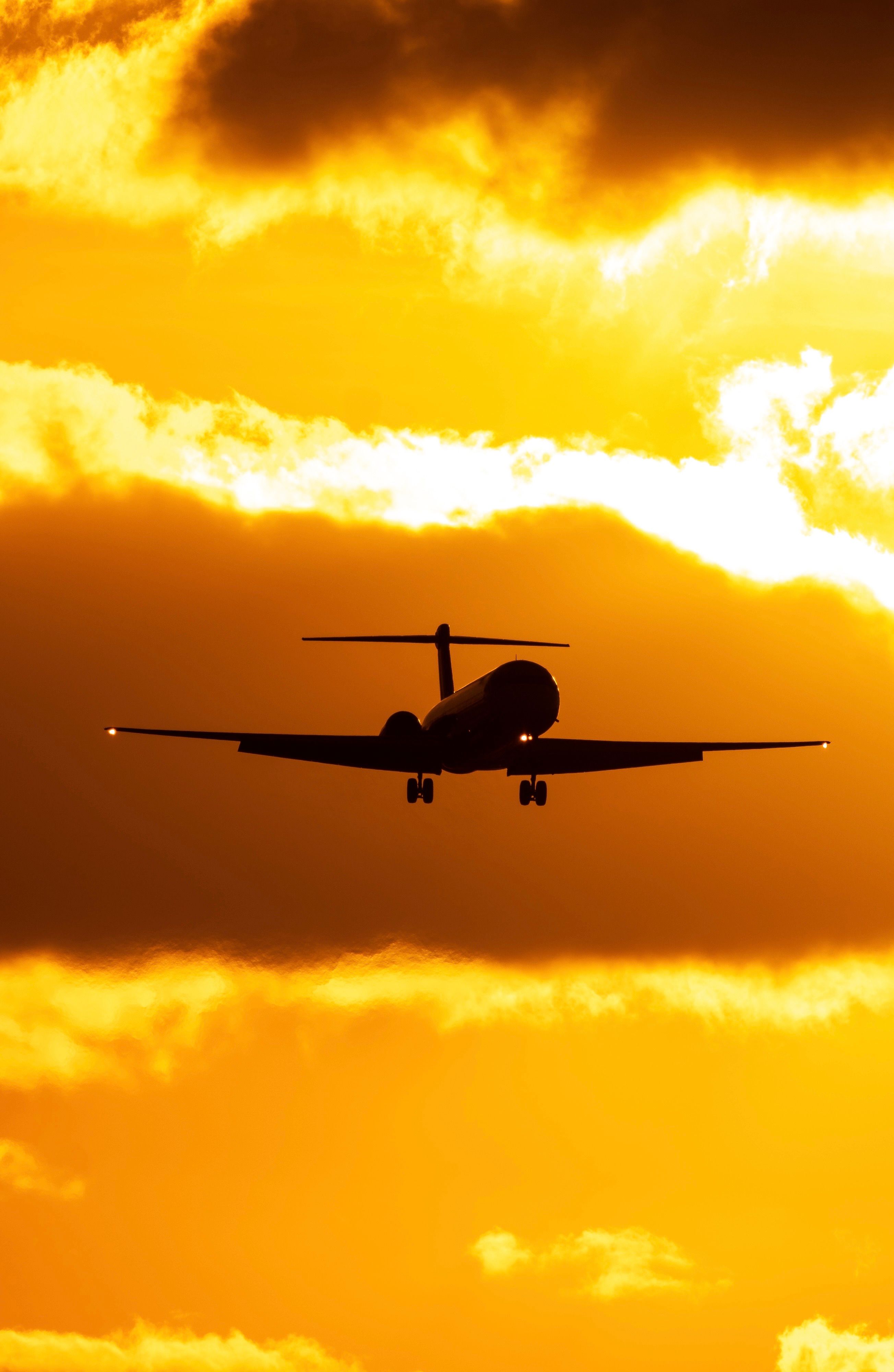 Shadow Image of a Plane Flying during Sunset · Free Stock Photo