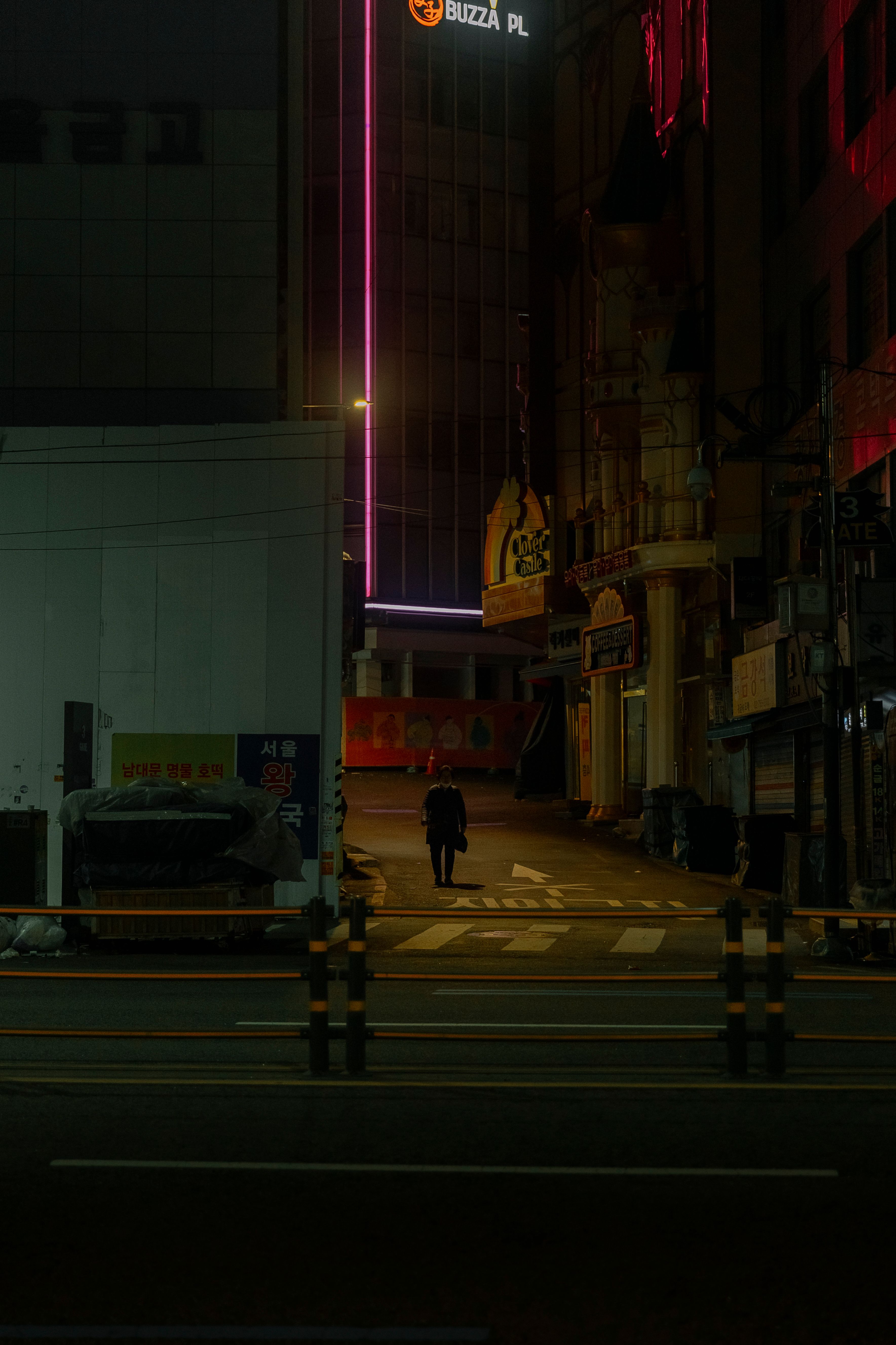 Person Walking on Street at Night · Free Stock Photo