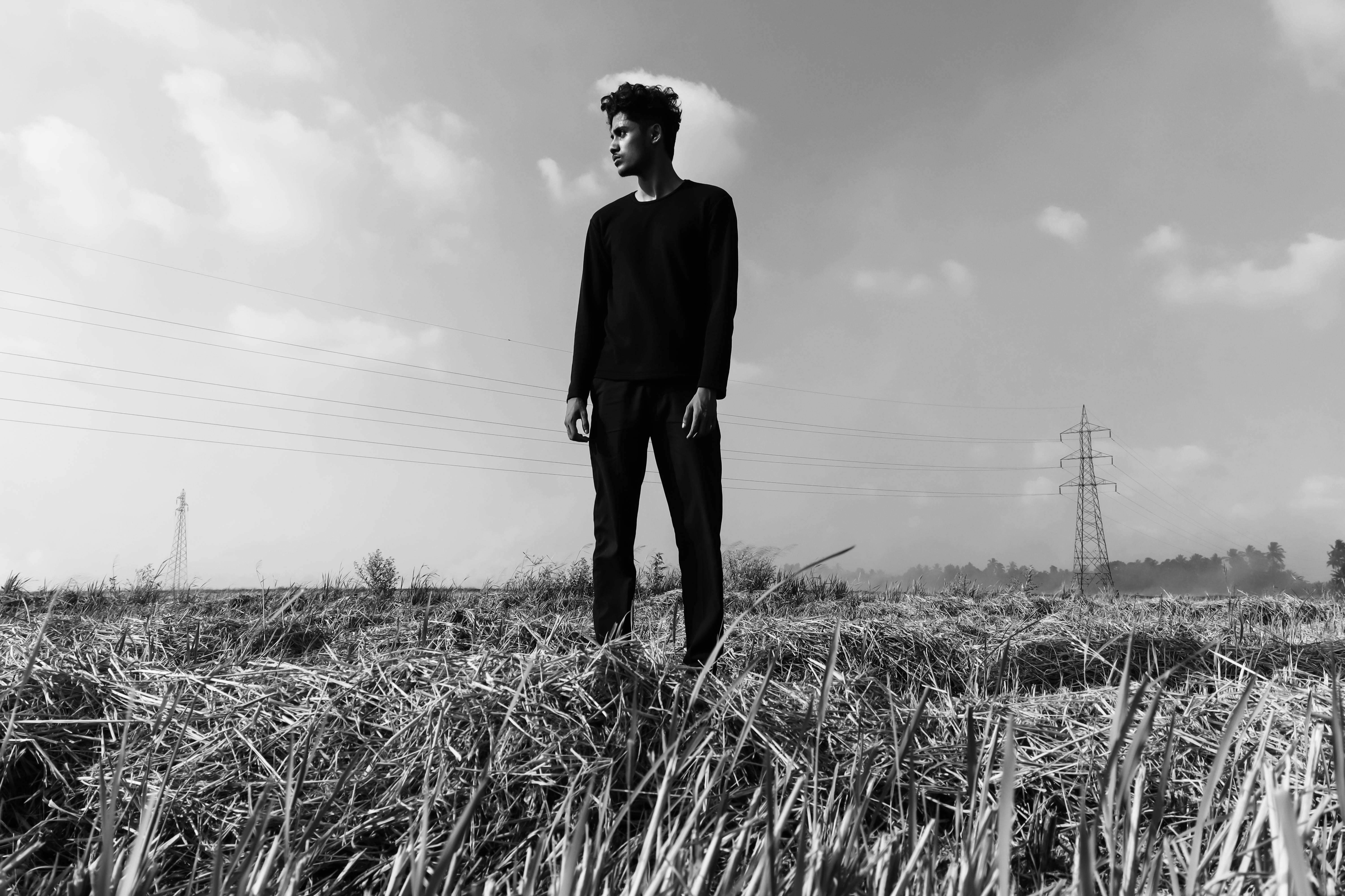 men stand alone in field · Free Stock Photo