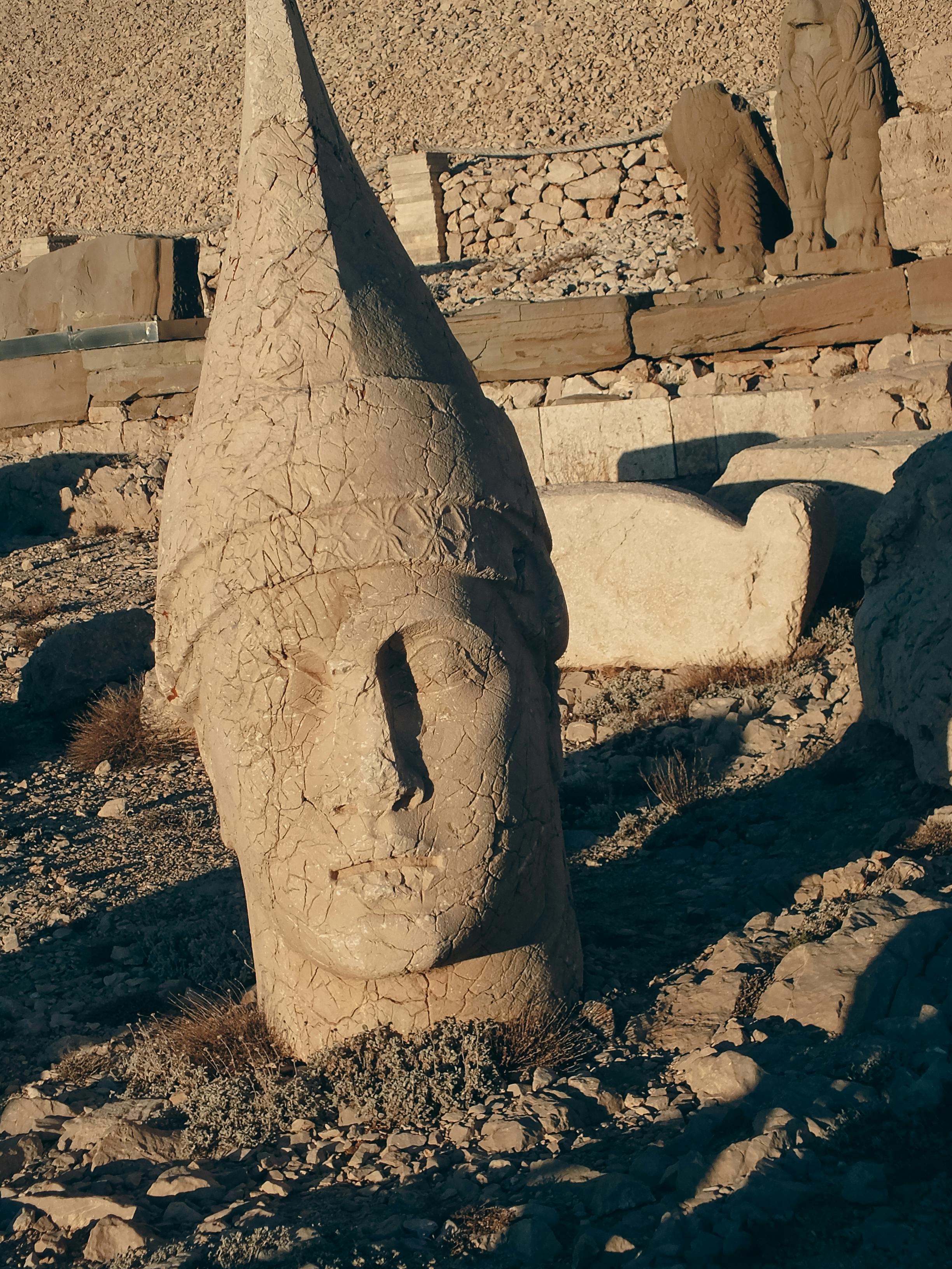 Fallen Stone Head of Sculpture · Free Stock Photo