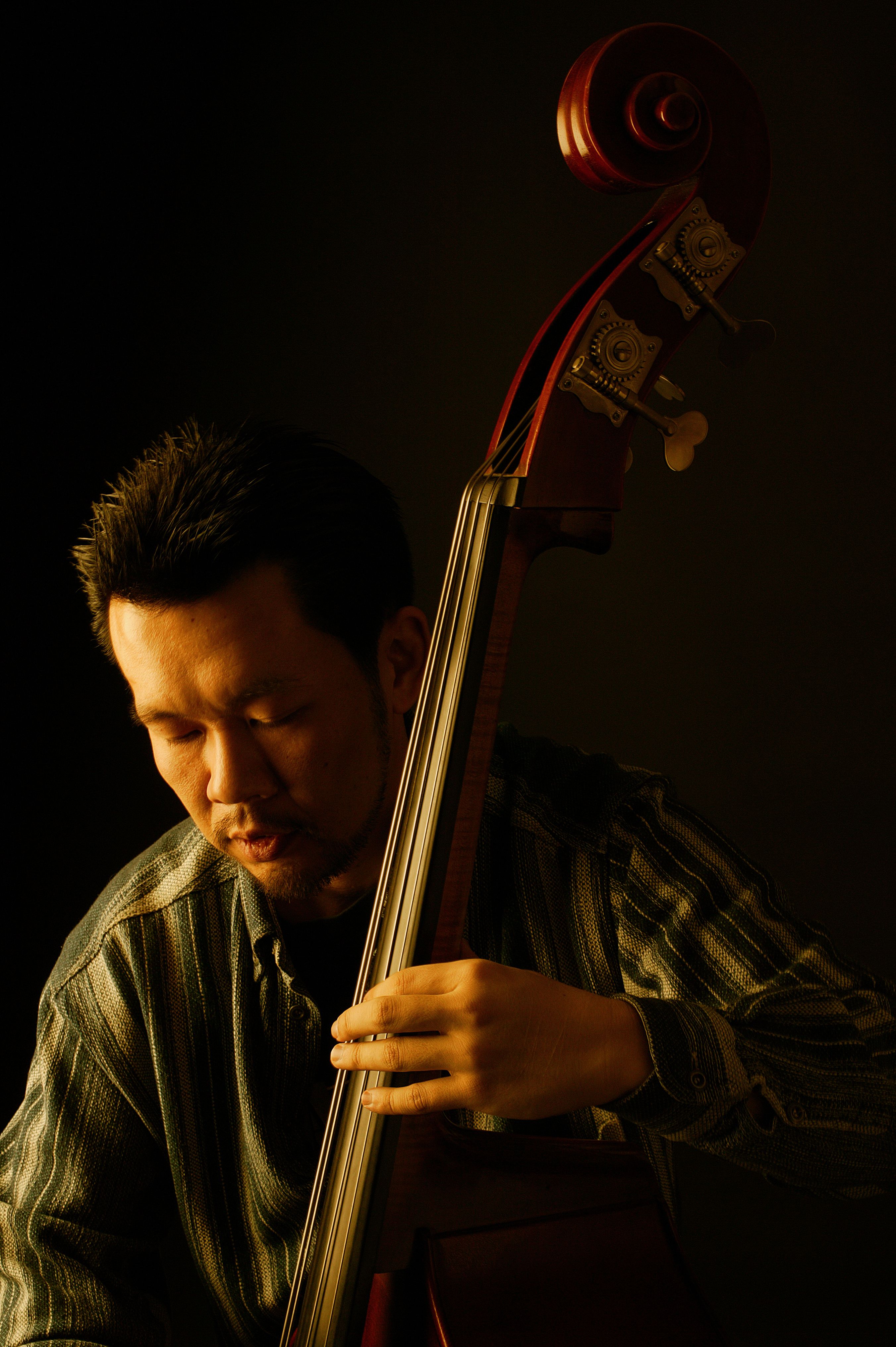 Portrait of Man Playing Cello · Free Stock Photo
