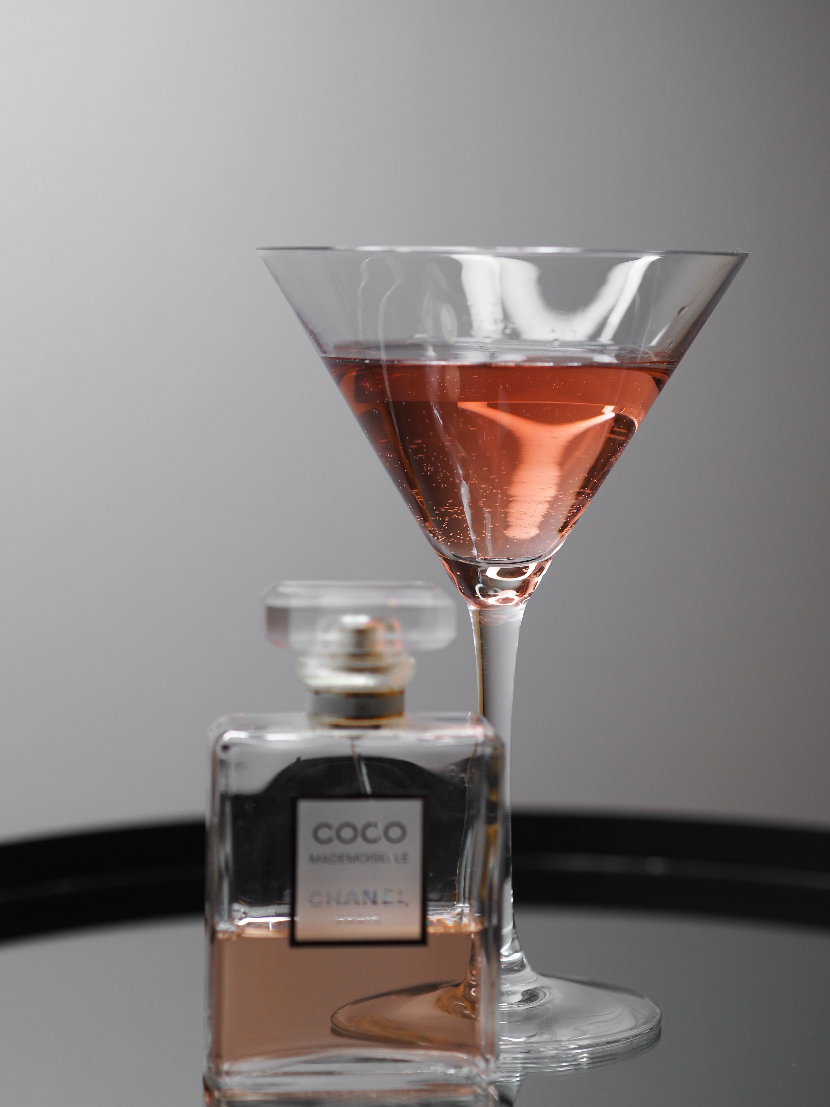 Glass of Drink and Vial of Perfume · Free Stock Photo