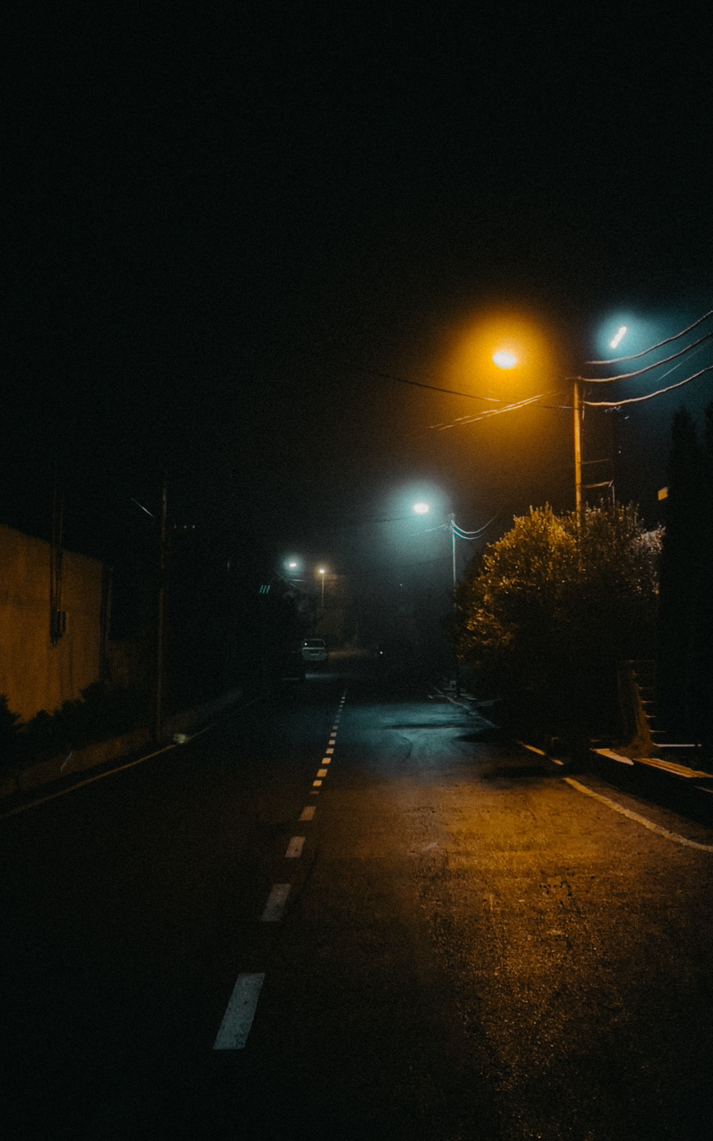 Illuminated Urban Street at Hazy Night · Free Stock Photo
