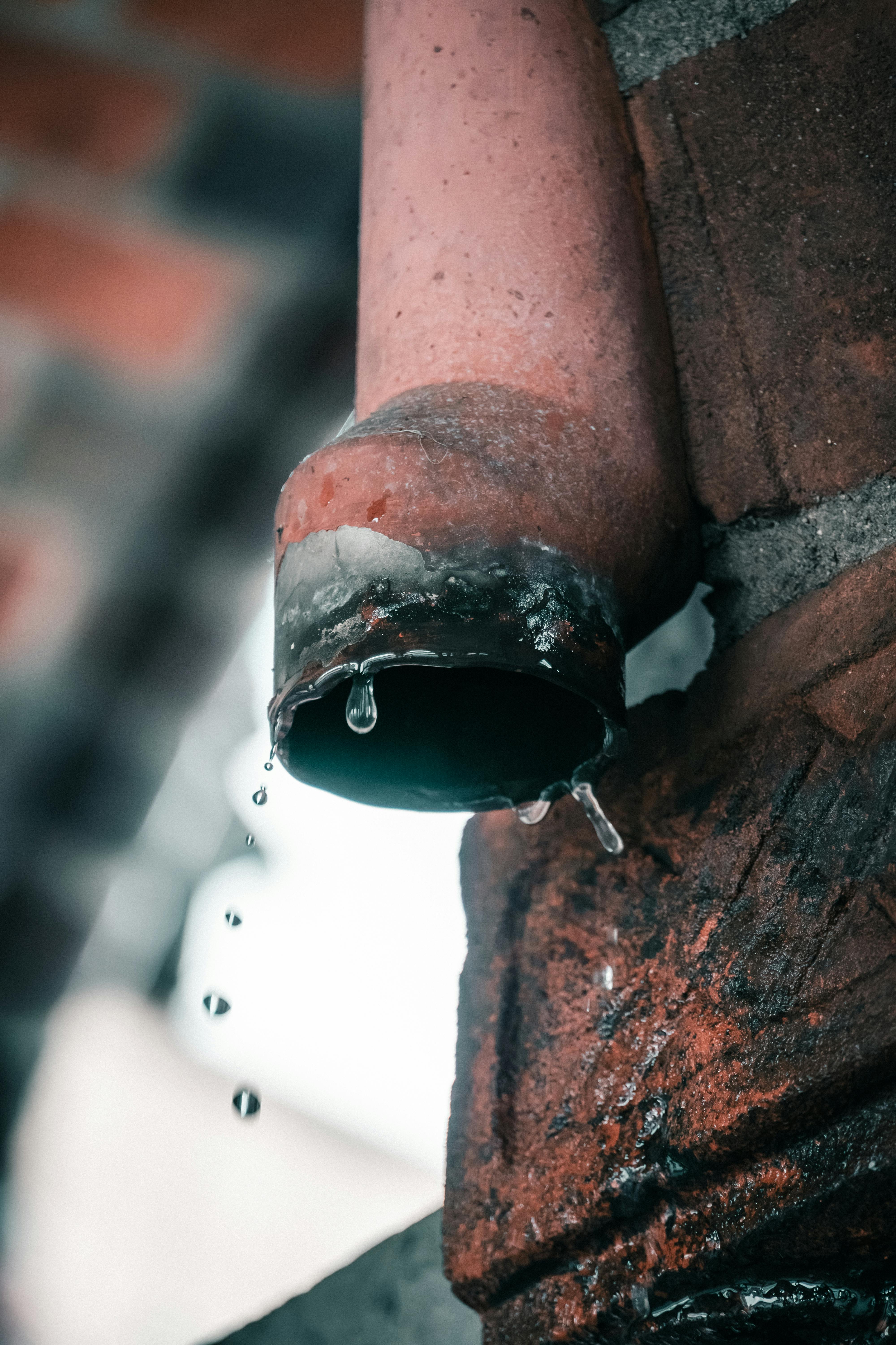 Water Droplets Coming out of a Pipe · Free Stock Photo