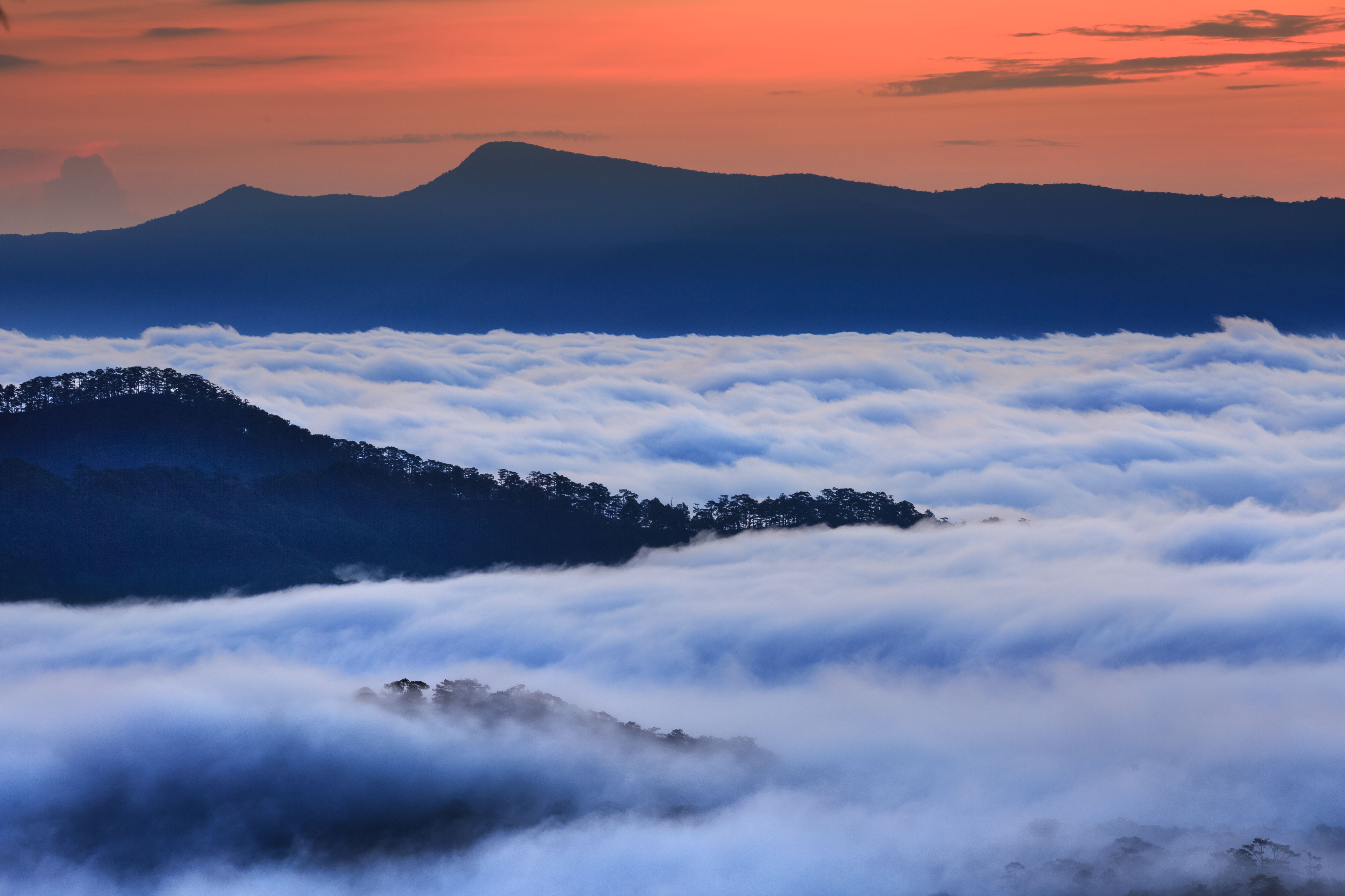 Aerial Photography Of Mountain With Clouds During Golden Hour Free