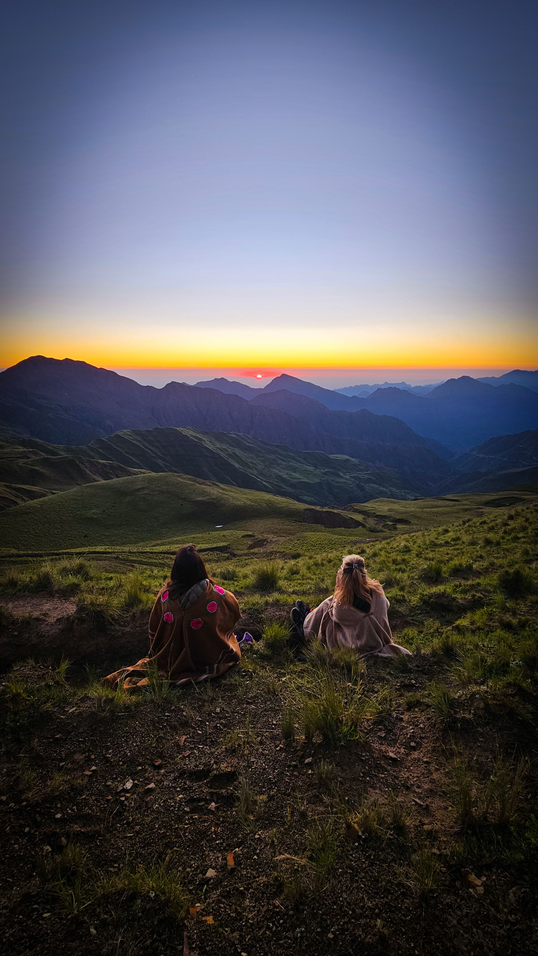 People Relaxing in Mountains at Dawn · Free Stock Photo