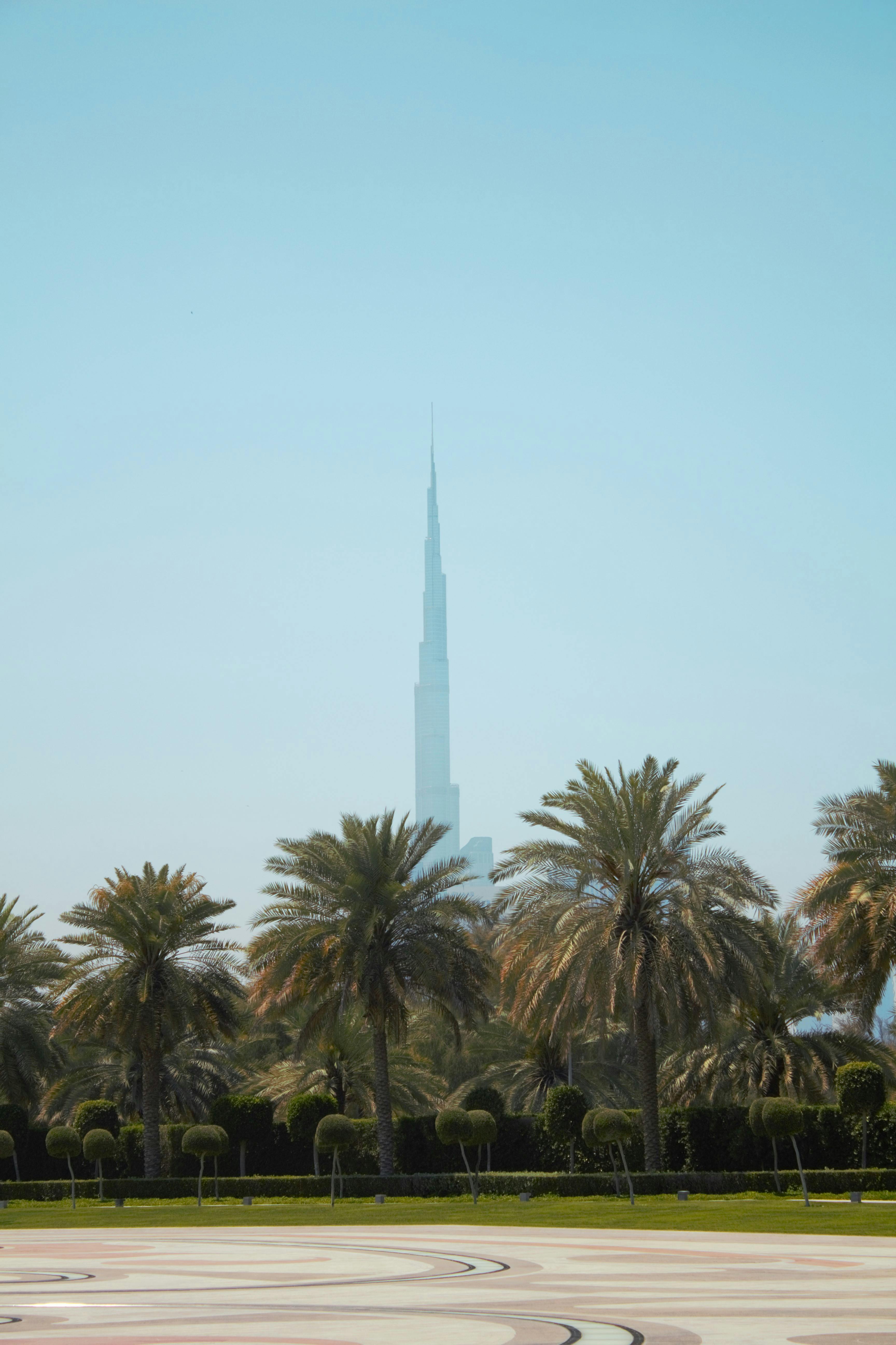 Burj Khalifa behind Palm Trees · Free Stock Photo