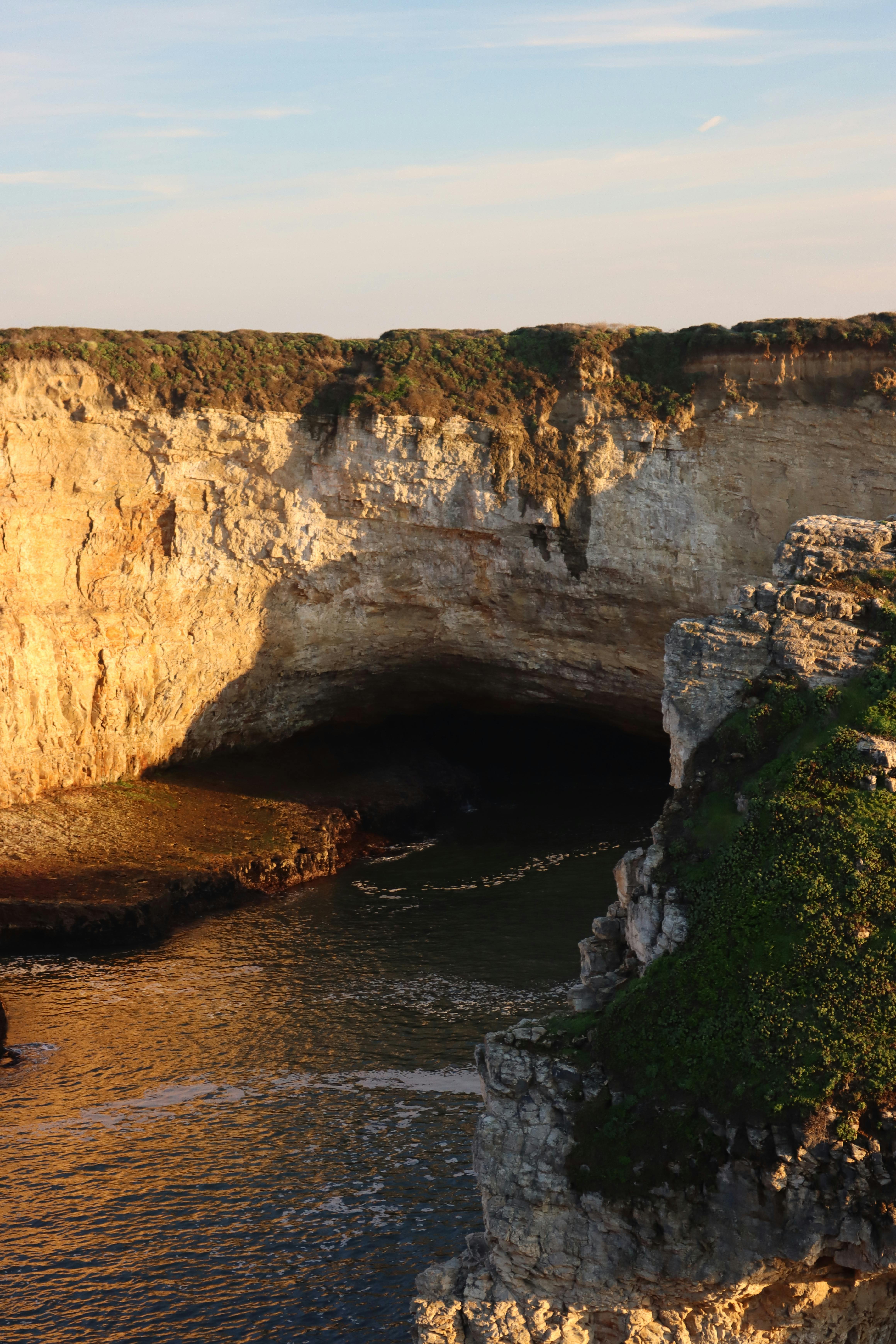 Entrance of a Coastal Cave · Free Stock Photo