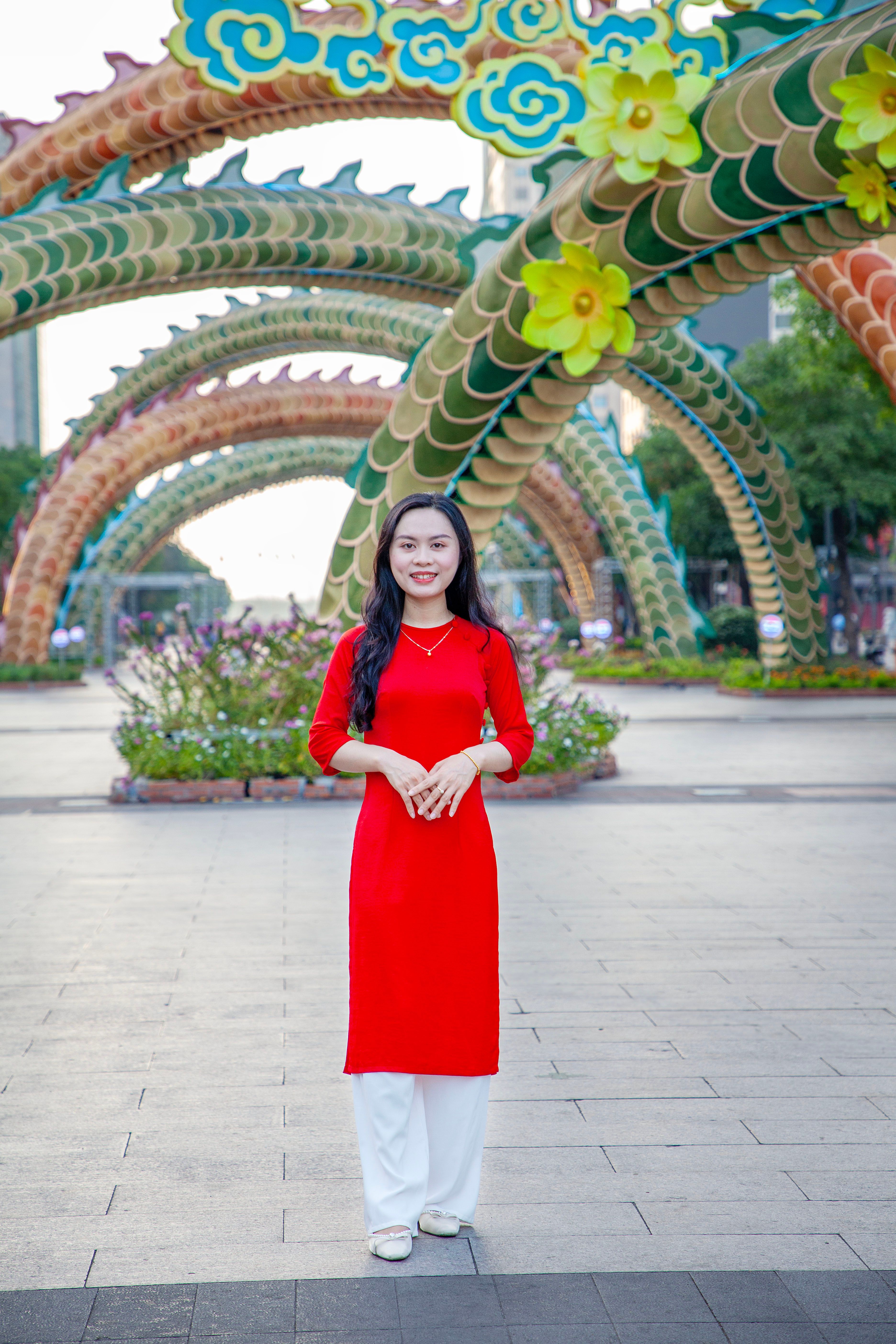 Woman in Red Dress Standing at Park · Free Stock Photo