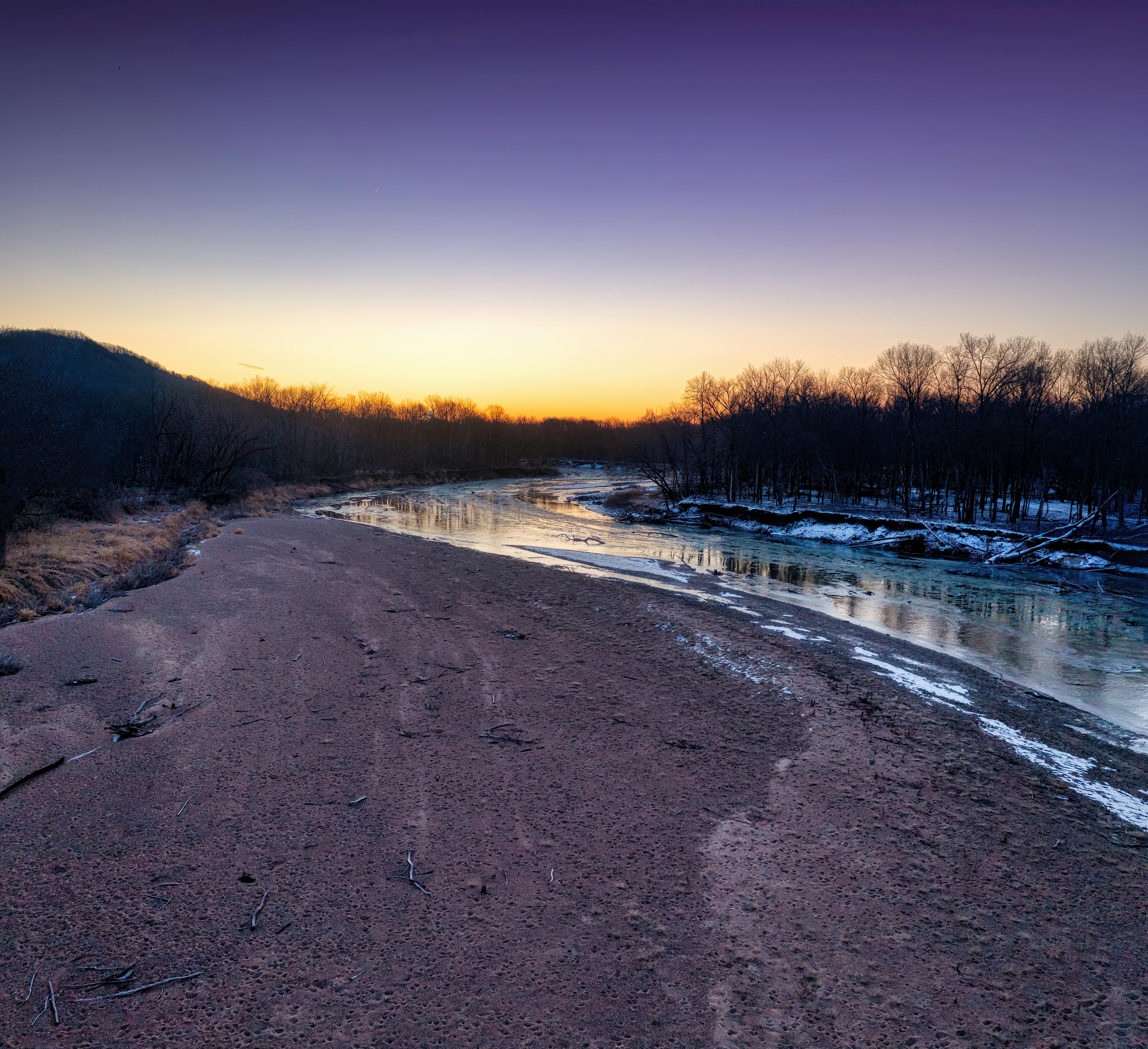 Beach on Riverbank at Sunset · Free Stock Photo